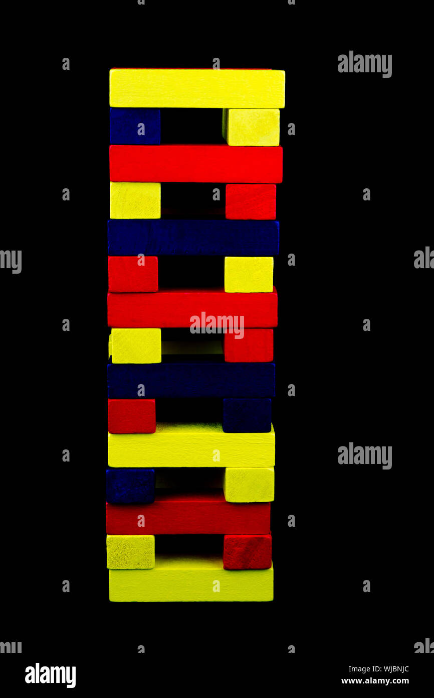 Coloured wooden play blocks isolated on a black background Stock Photo ...