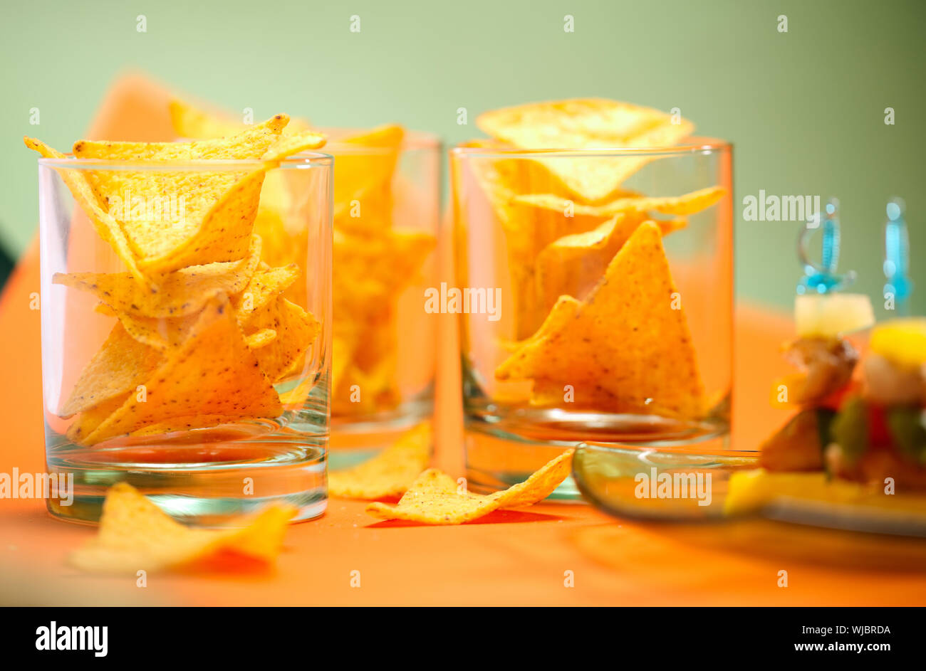 Crispy corn chips in glass Stock Photo - Alamy