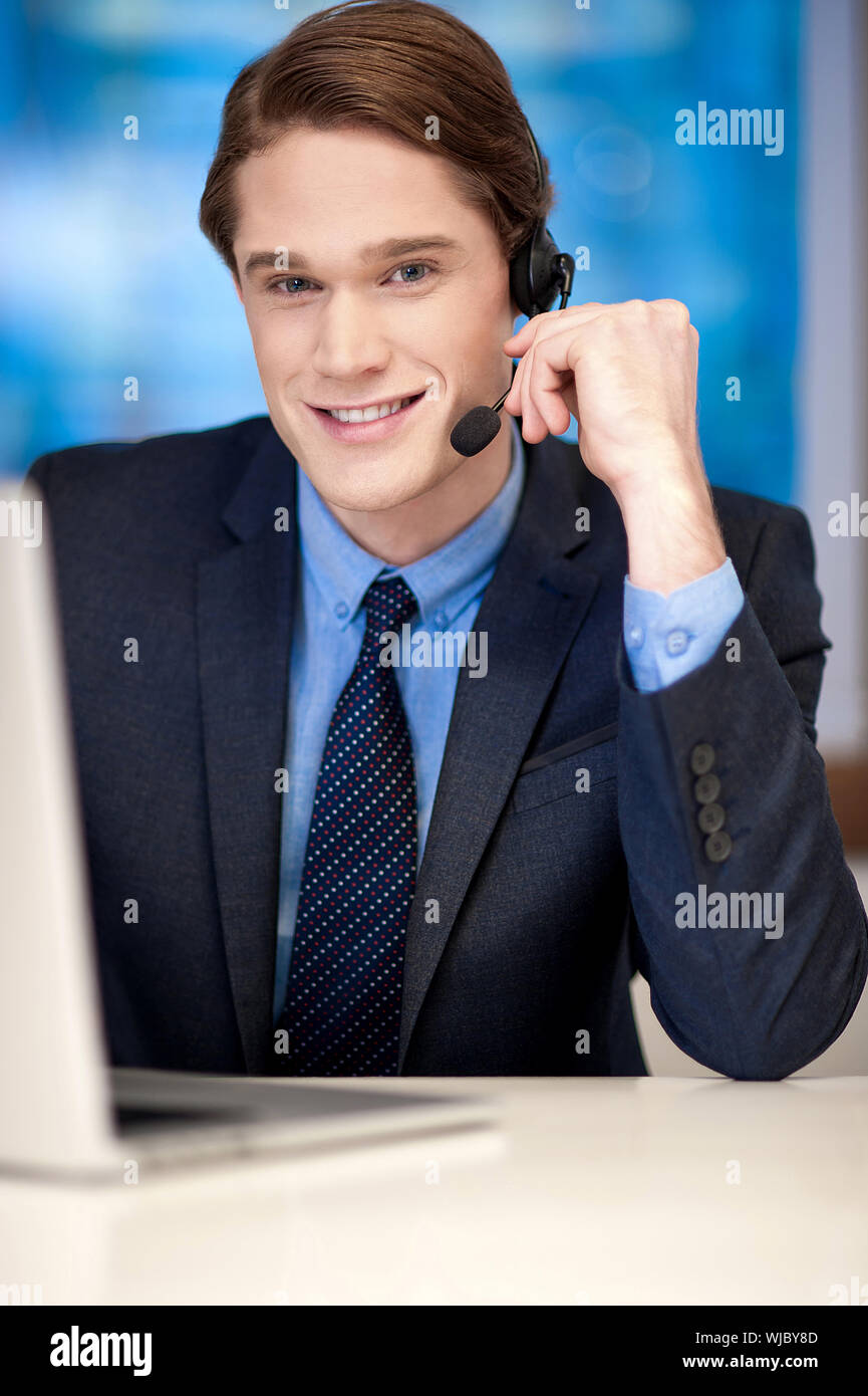 Smart business professional busy working in office Stock Photo - Alamy