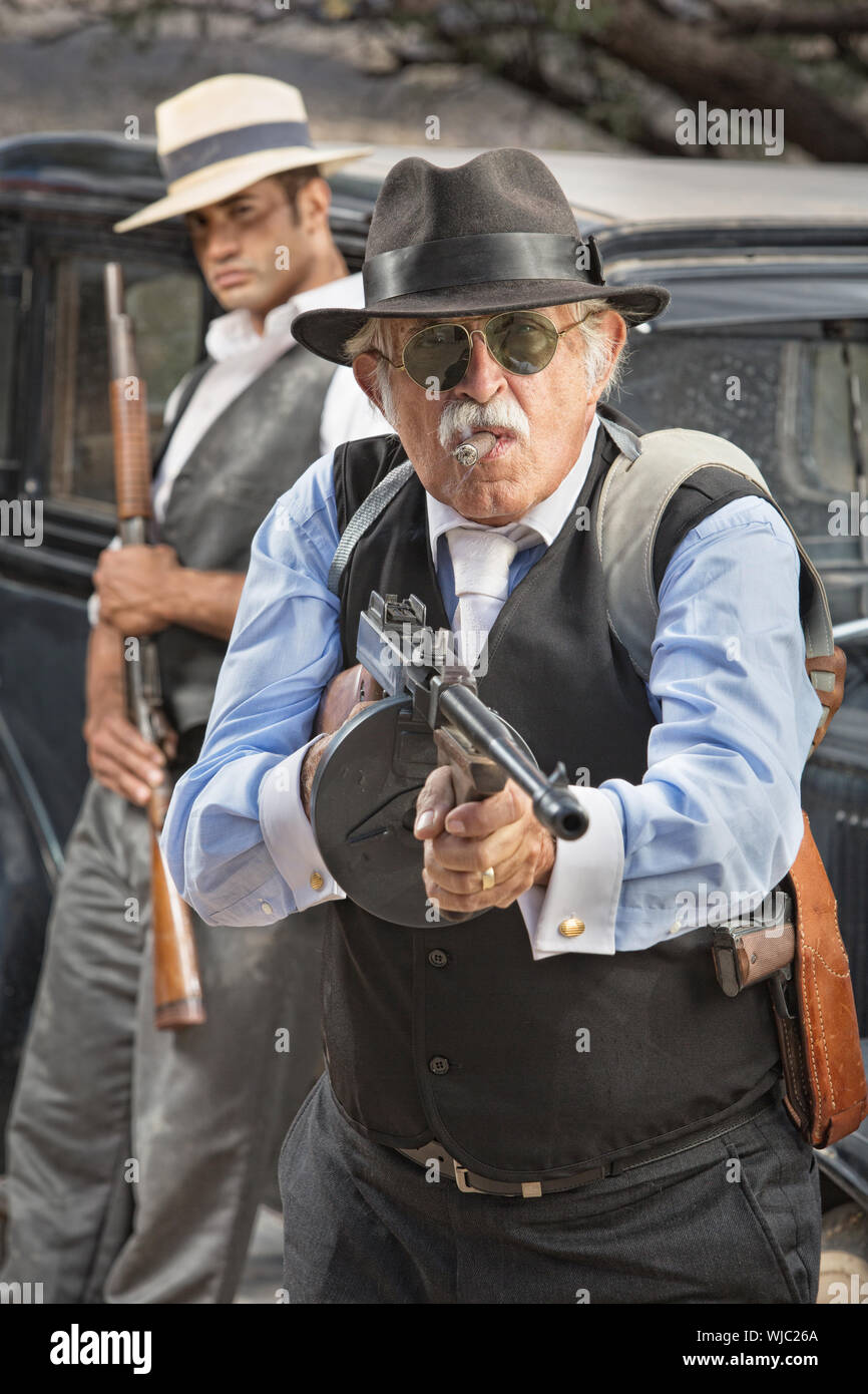1920s man holding weapons hi-res stock photography and images - Alamy