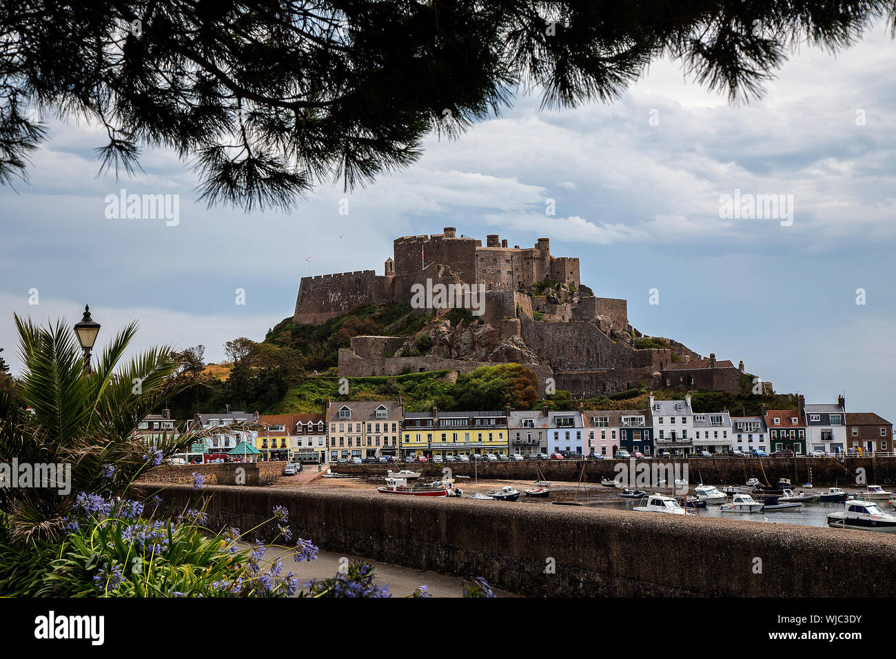 A view of Gorey (Orguiel) Castle, Jersey, and harbour Stock Photo - Alamy