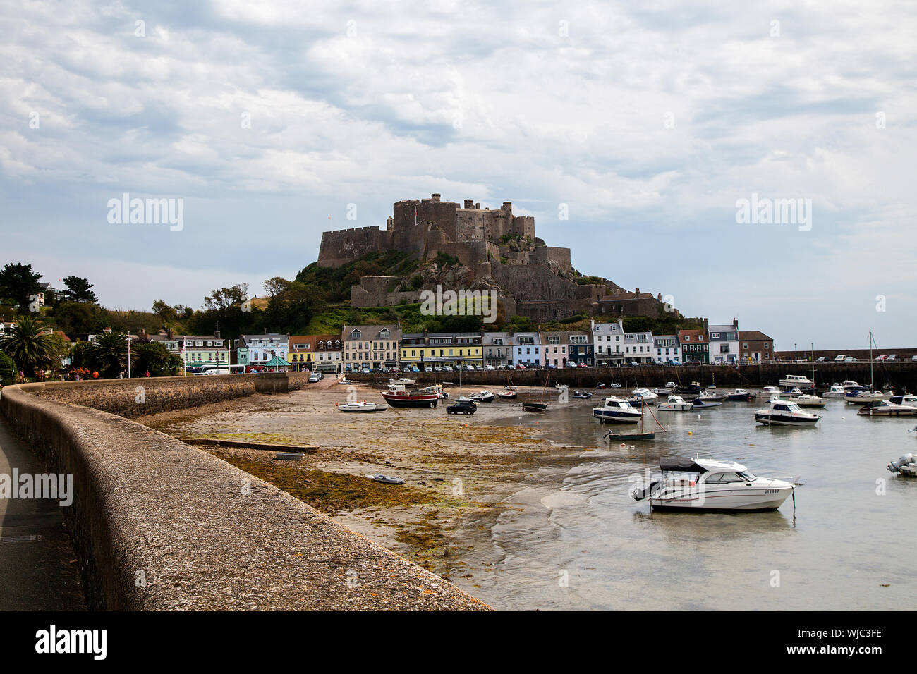 A view of Gorey (Orguiel) Castle, Jersey, and harbour Stock Photo - Alamy