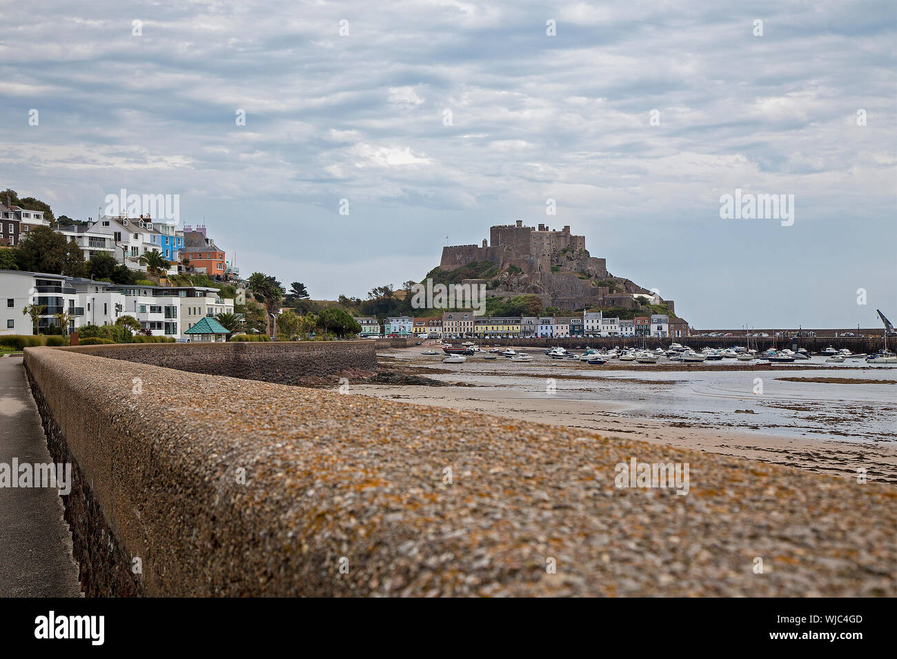 A view of Gorey (Orguiel) Castle, Jersey, and harbour Stock Photo - Alamy