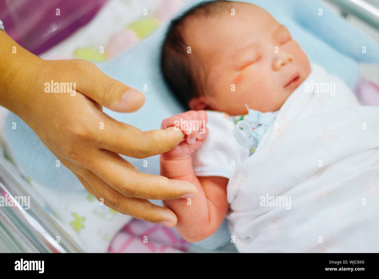 Newborn finger hi-res stock photography and images - Alamy