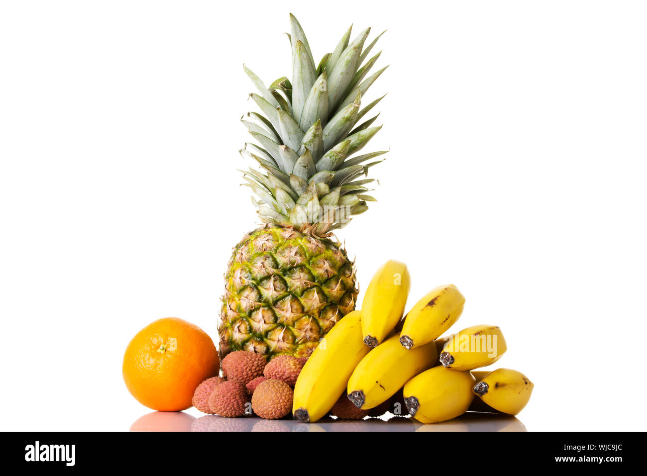 Composition of fresh exotic fruits. Isolated on white Stock Photo - Alamy