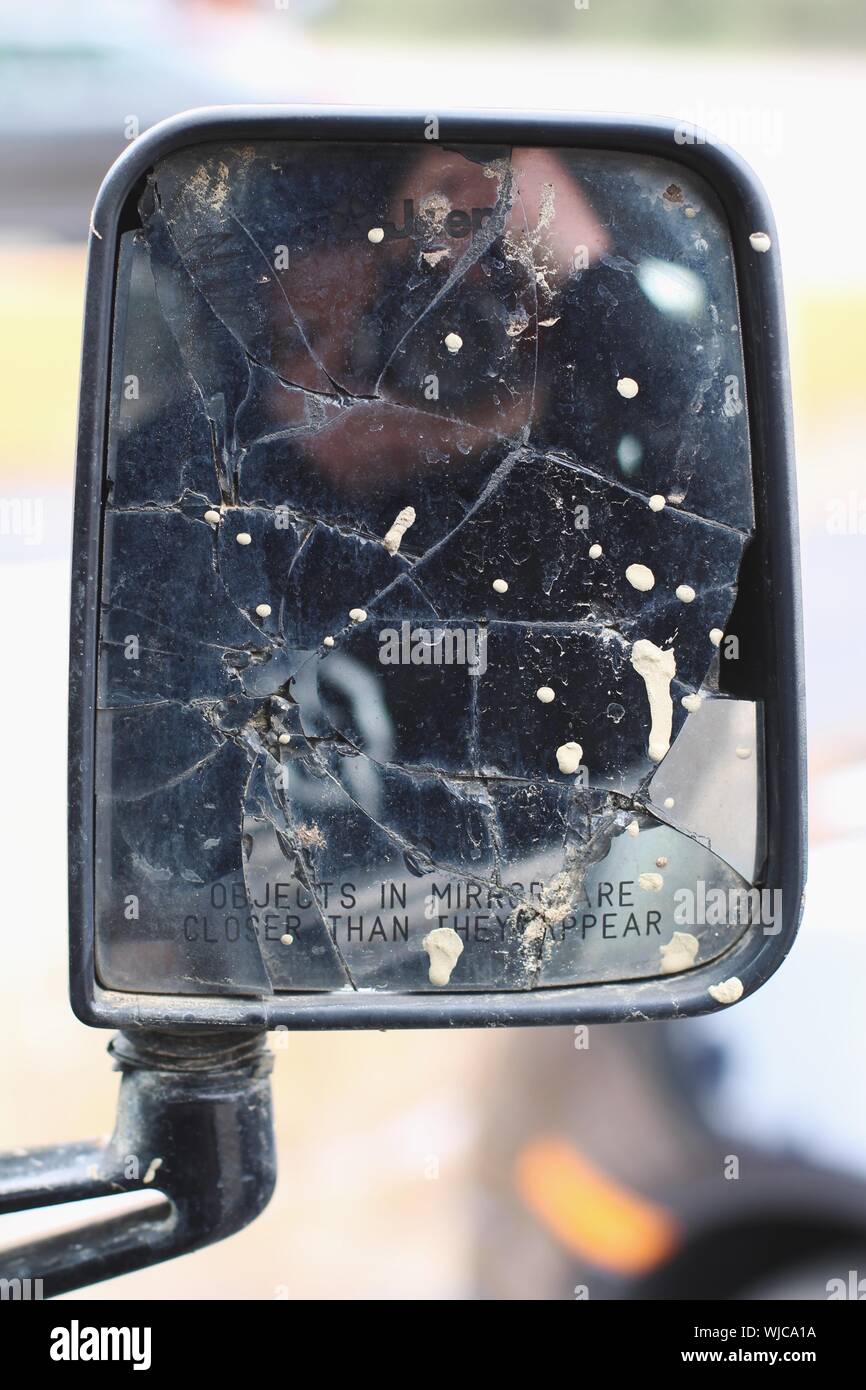 Reflection on cracked mirror hi-res stock photography and images - Alamy