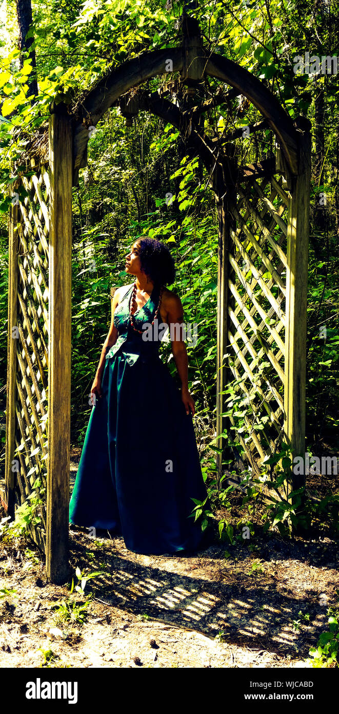 Woman standing in archway hi-res stock photography and images - Alamy