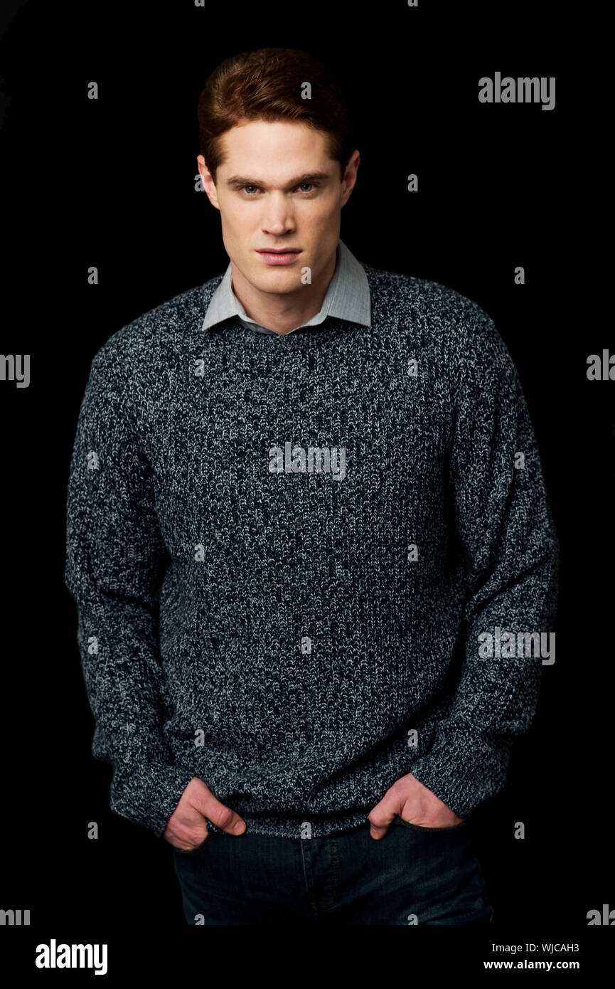 Smart young man posing in style Stock Photo - Alamy