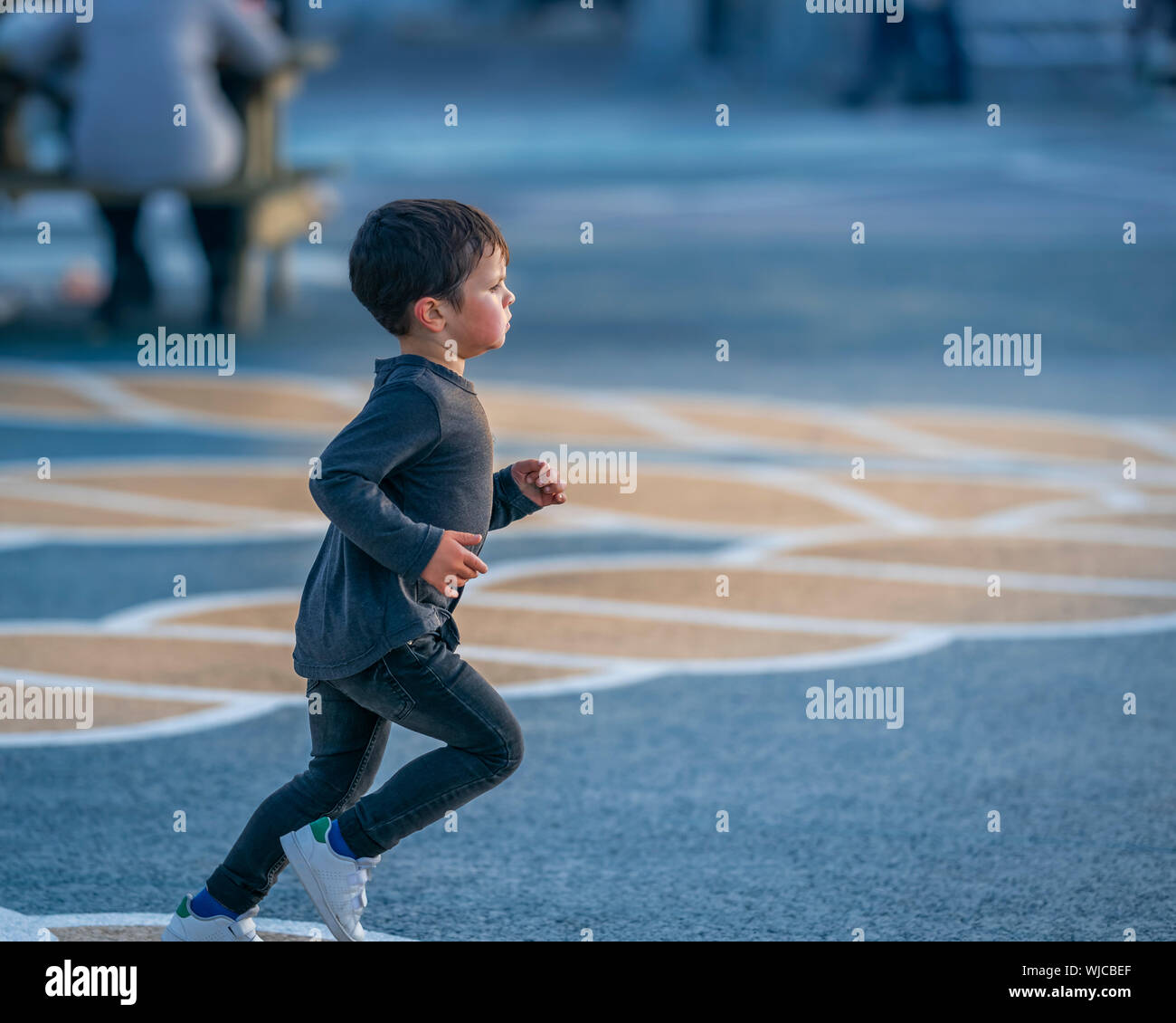 Young boy running, street scene, Menningarnott or Cultural day ...