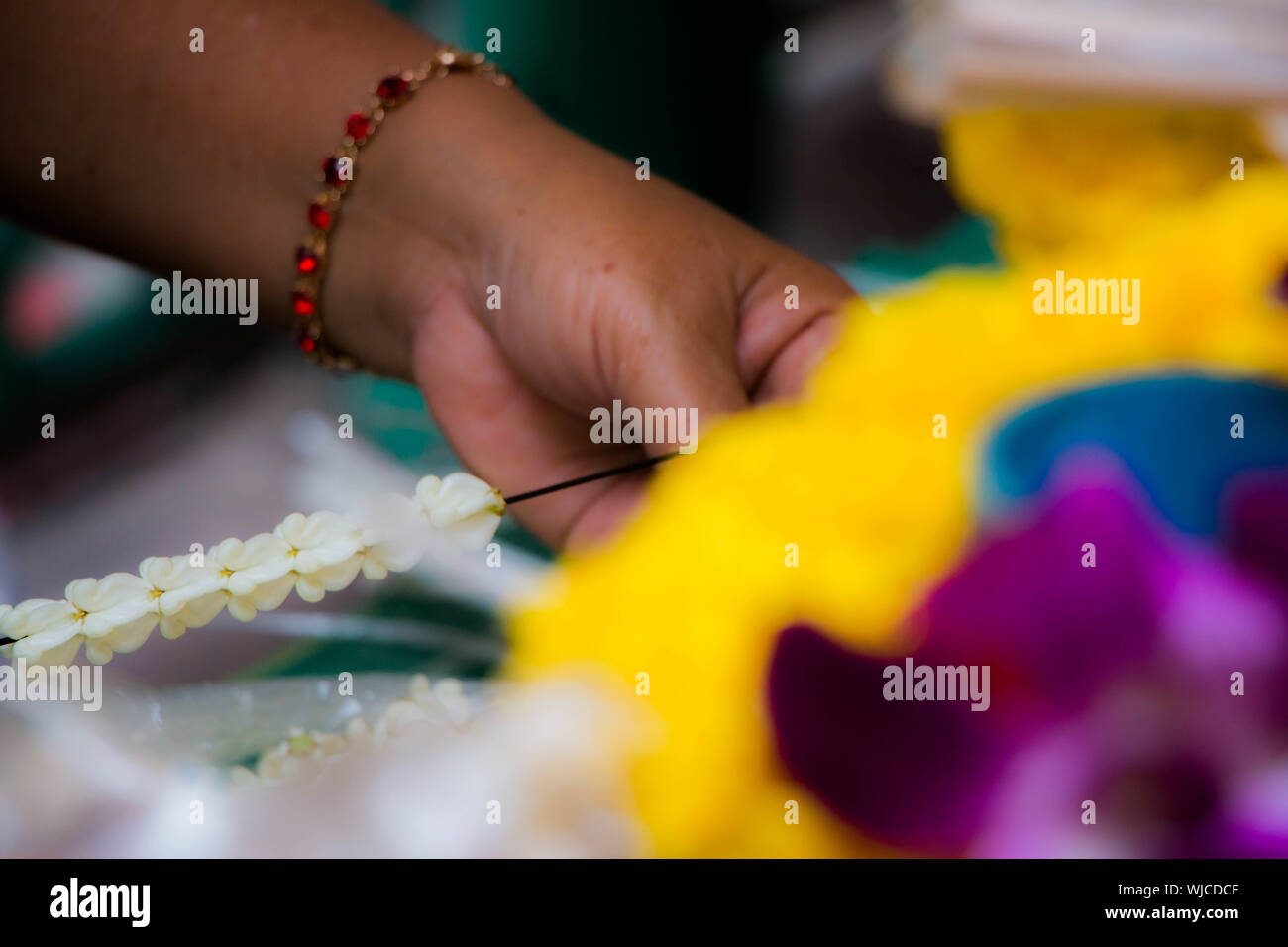 Multi colored flower garland hi-res stock photography and images - Alamy