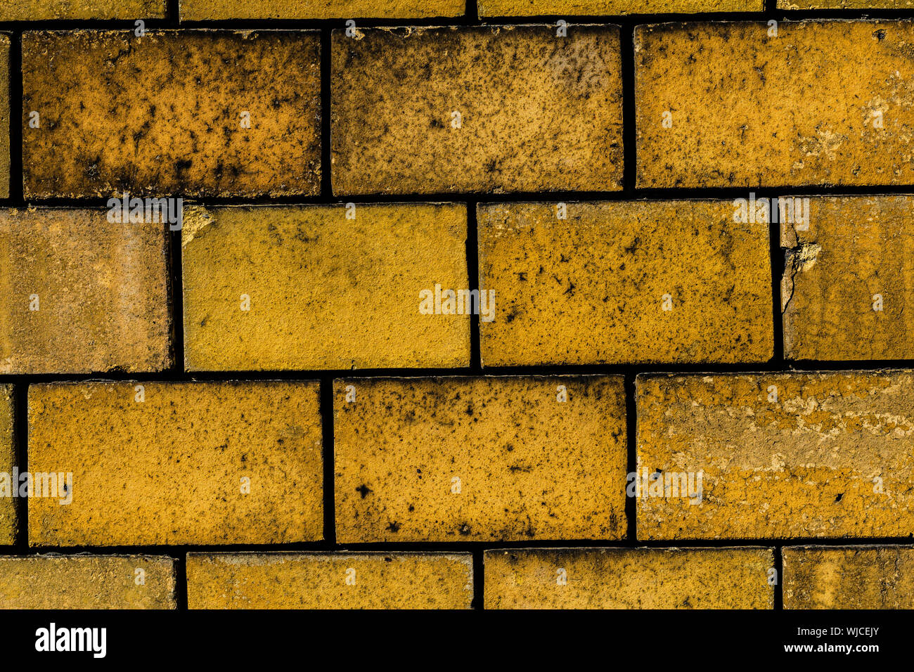 vintage yellow brick wall pattern background Stock Photo - Alamy