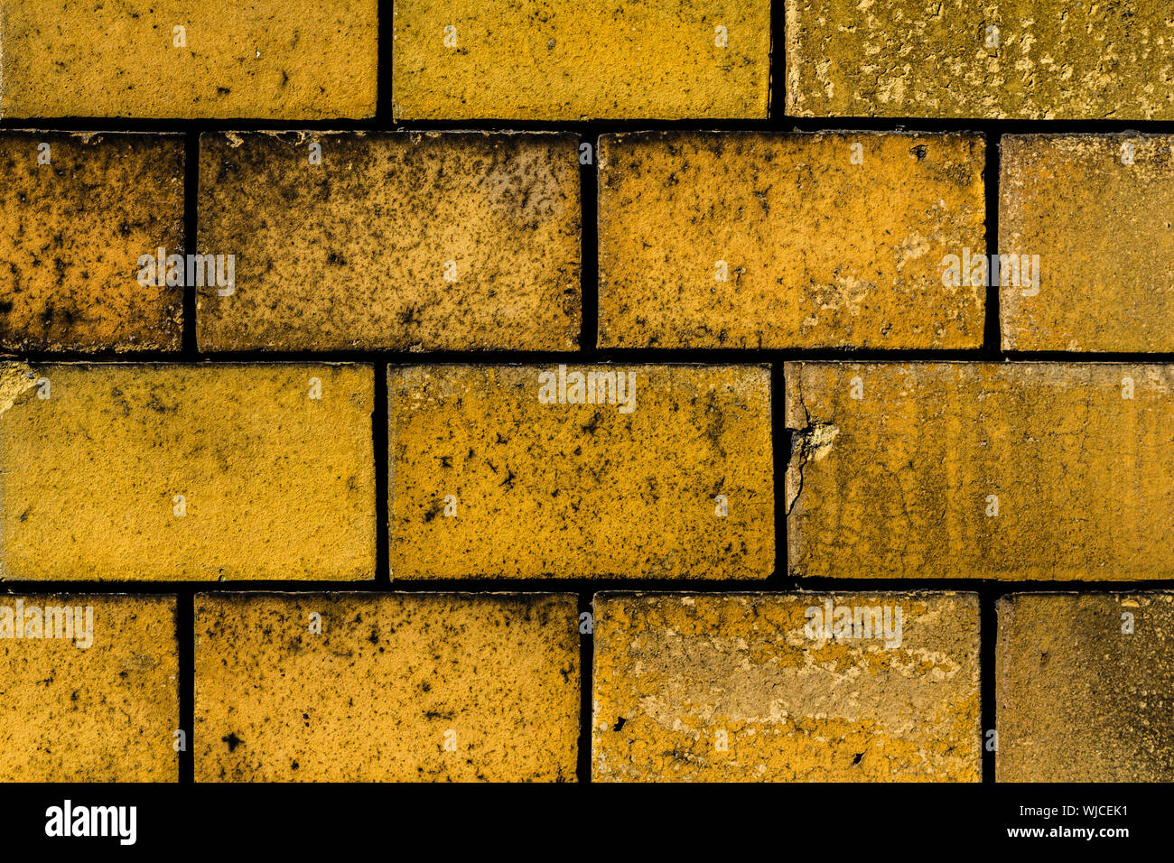 vintage yellow brick wall pattern background Stock Photo - Alamy