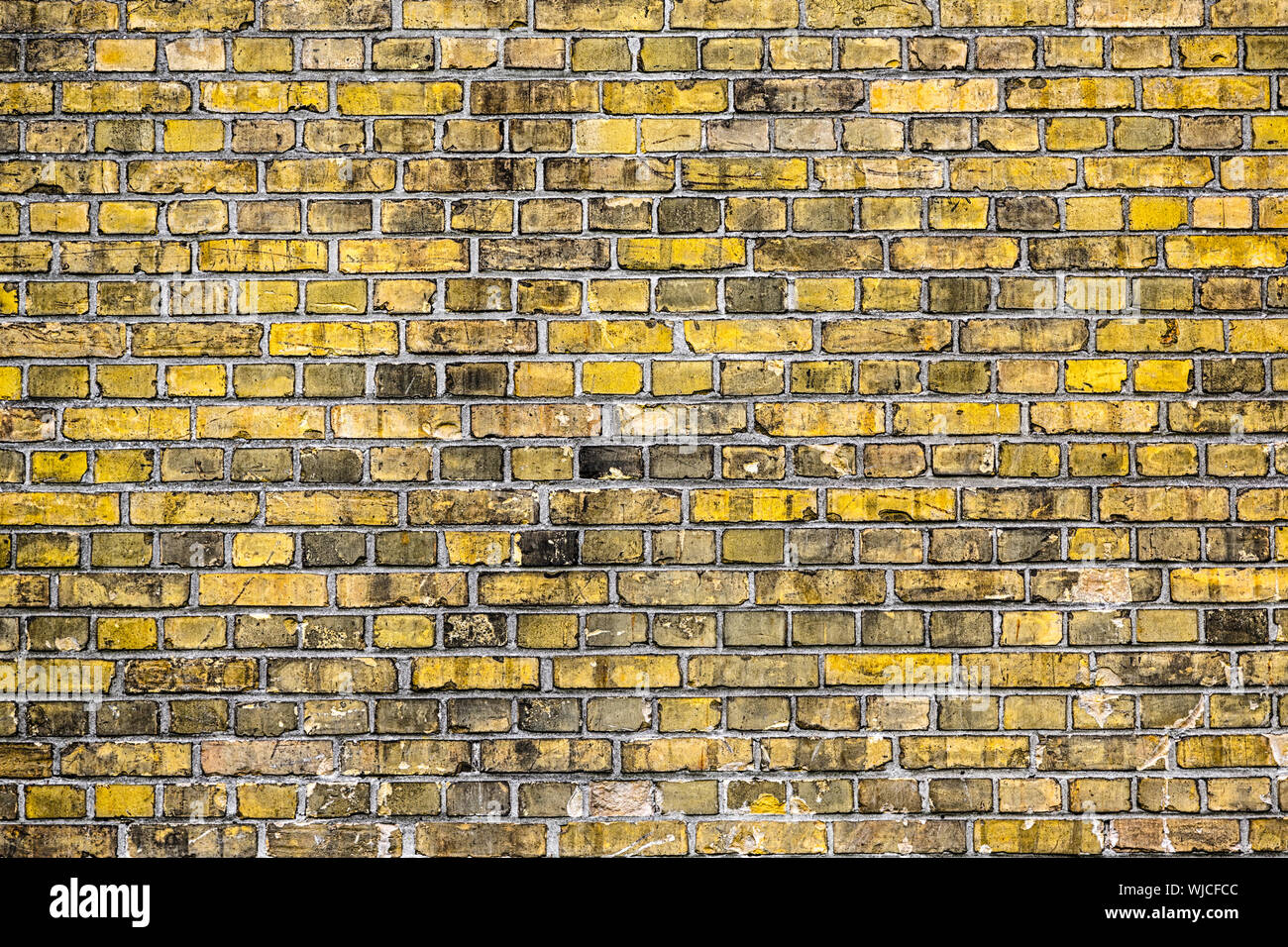 vintage yellow brick wall pattern background Stock Photo - Alamy