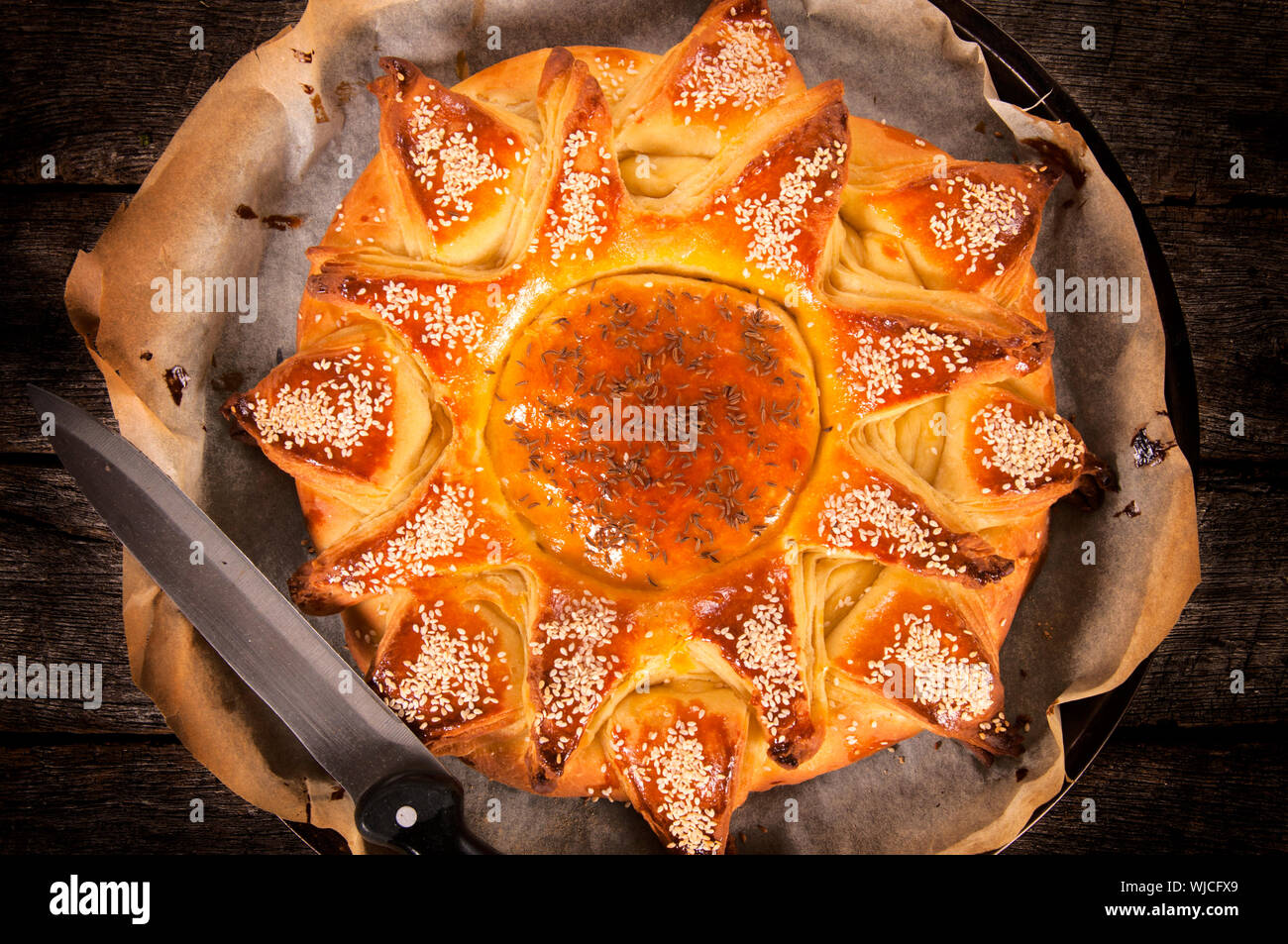 Bread in sun shape on the table,from above Stock Photo - Alamy