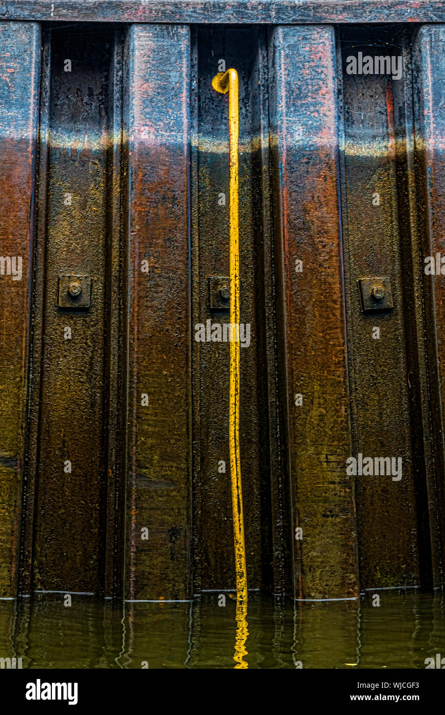 yellow pipe in a sluice Stock Photo - Alamy