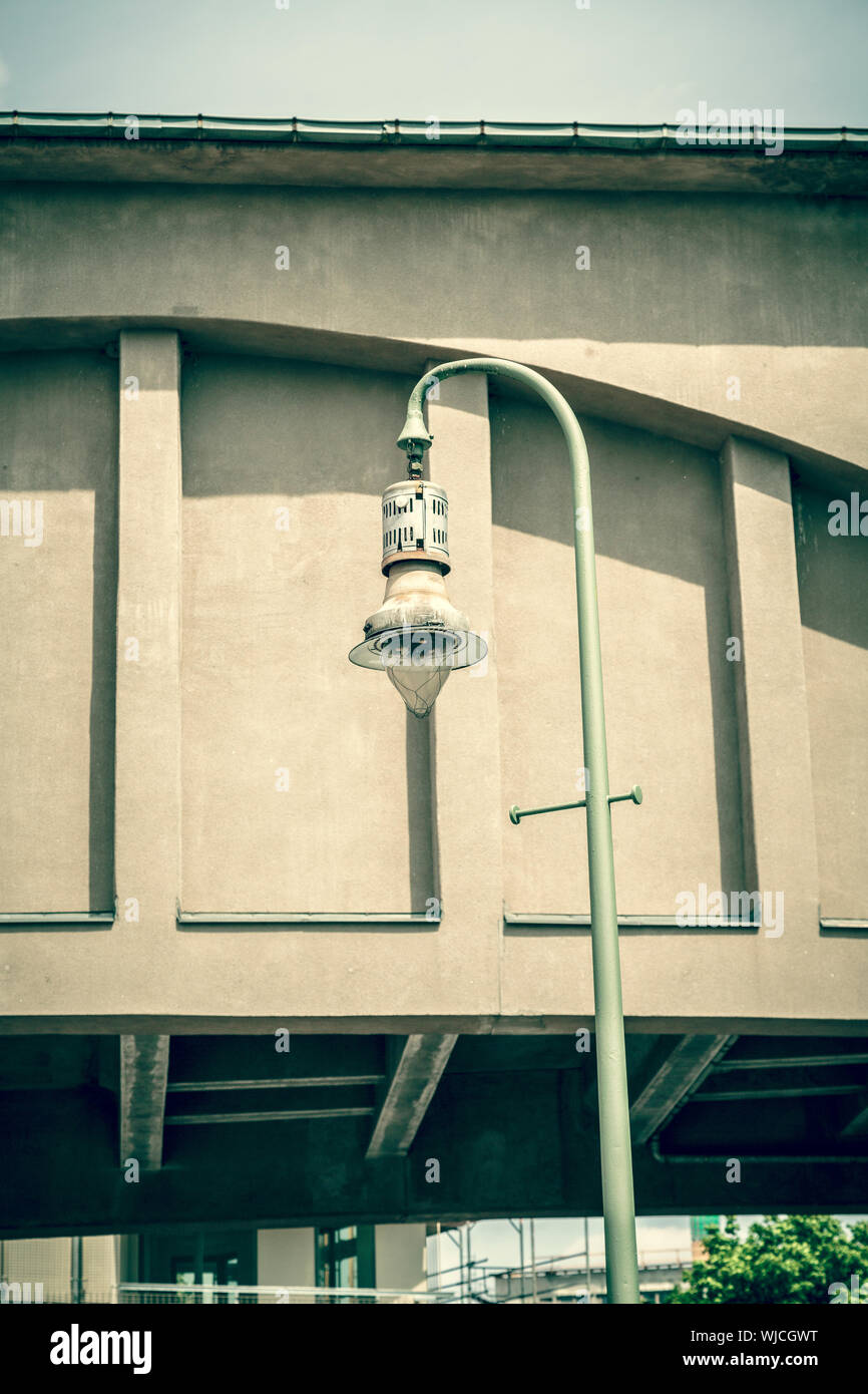 old vintage street light in front of a bridge, shoot in Berlin Germany ...
