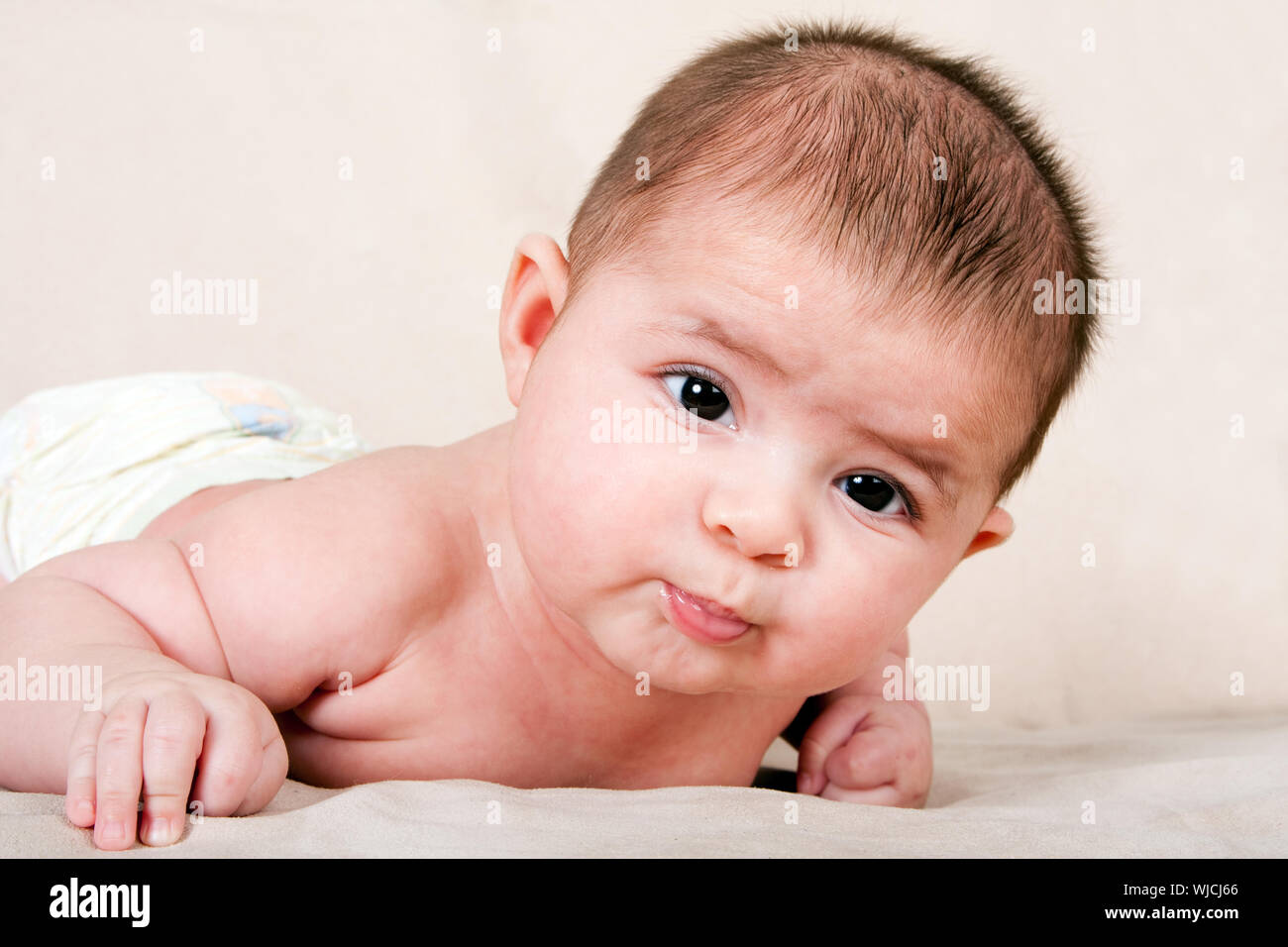 Infant girl making face hi-res stock photography and images - Alamy