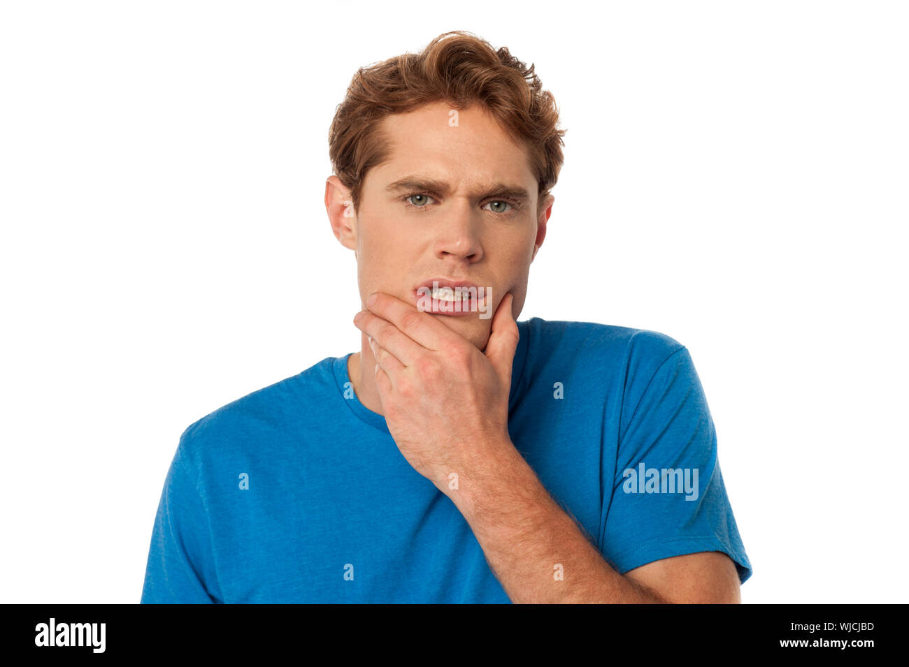 Handsome young guy thinking about his future Stock Photo - Alamy
