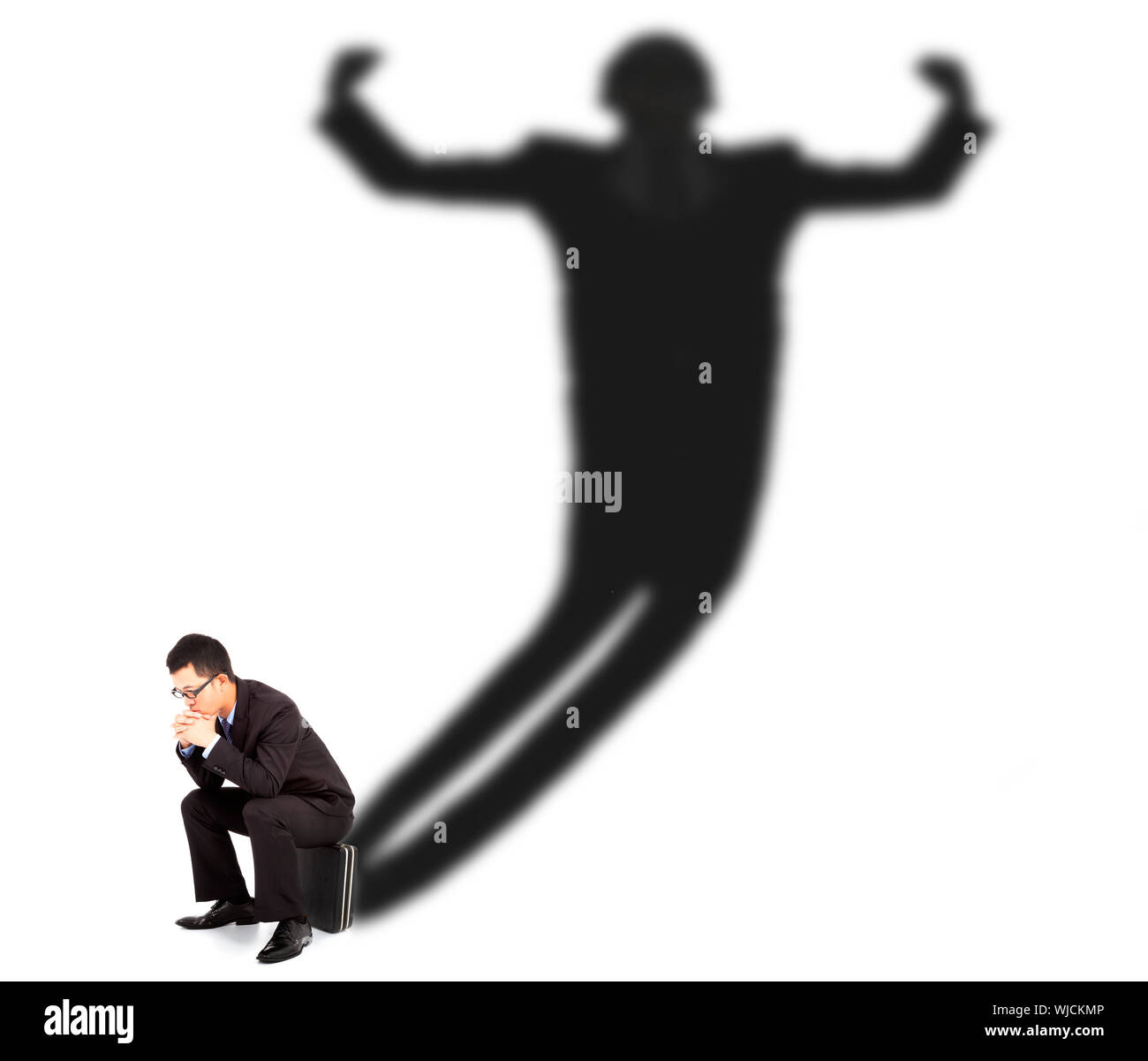 Image sad person sitting alone Cut Out Stock Images & Pictures - Alamy