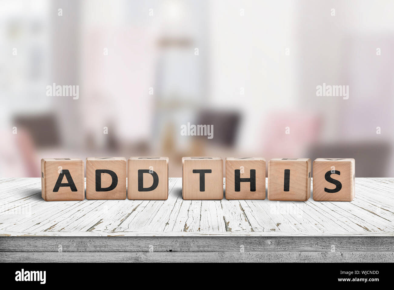 Add this message sign for social media posts in a bright room on a ...