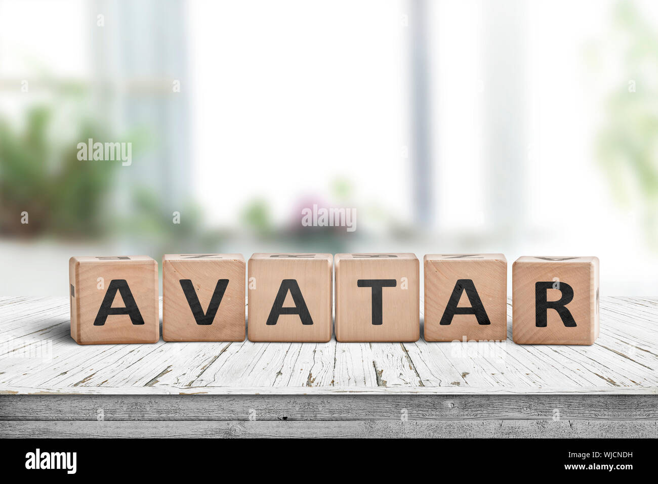 Avatar word on a wooden sign made of blocks in a bright living room ...