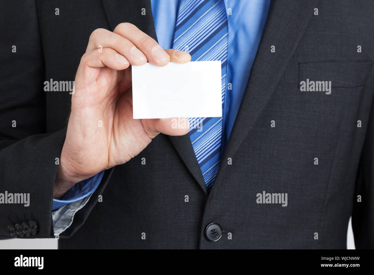 A business man showing his business card Stock Photo - Alamy