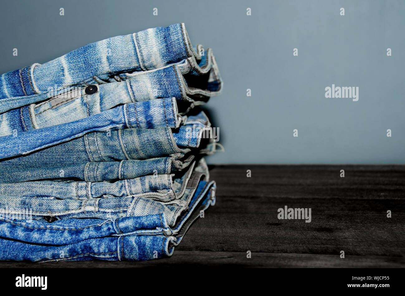 Stack blue jeans hi-res stock photography and images - Alamy