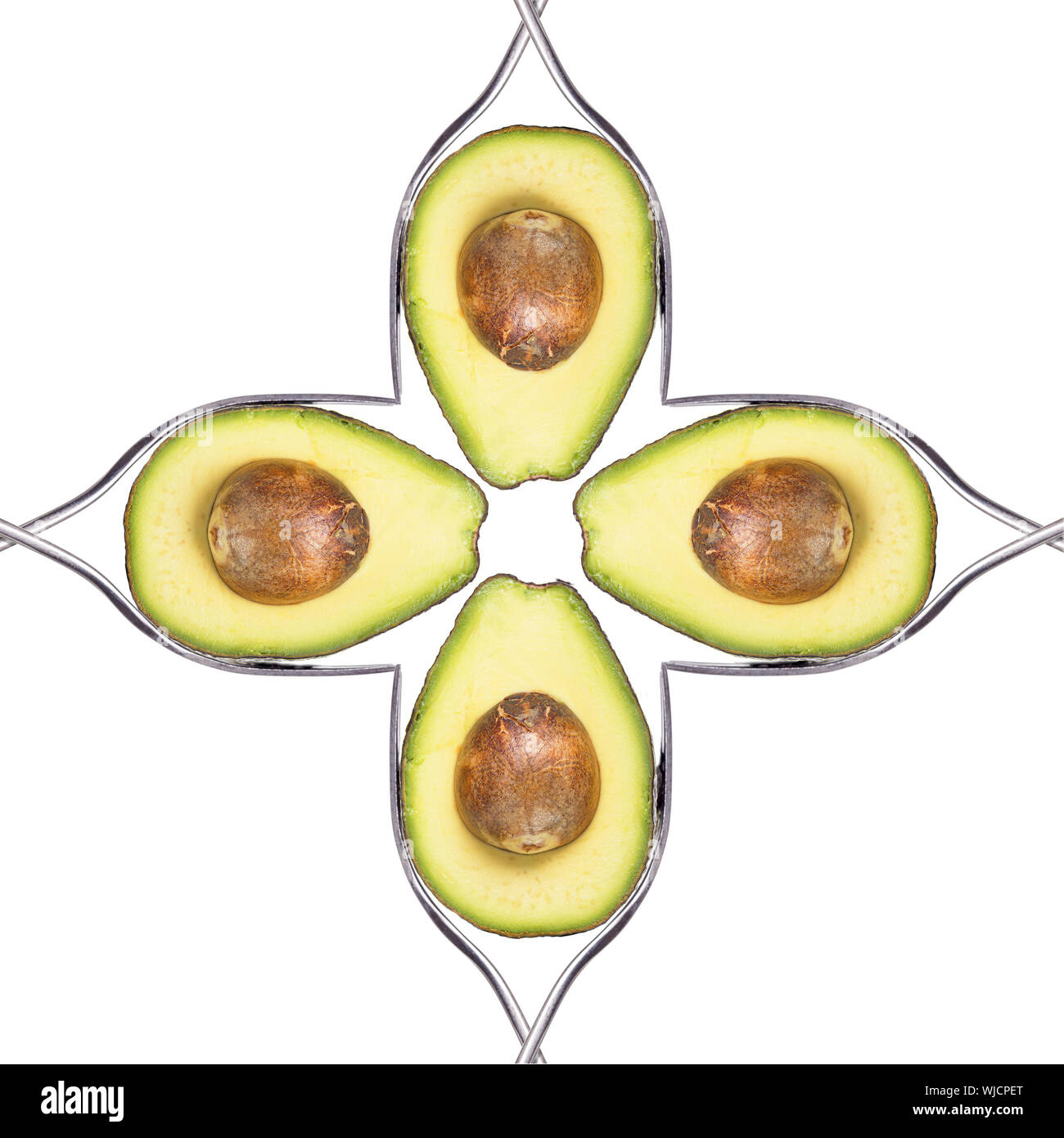 Avocado halfs hi-res stock photography and images - Alamy