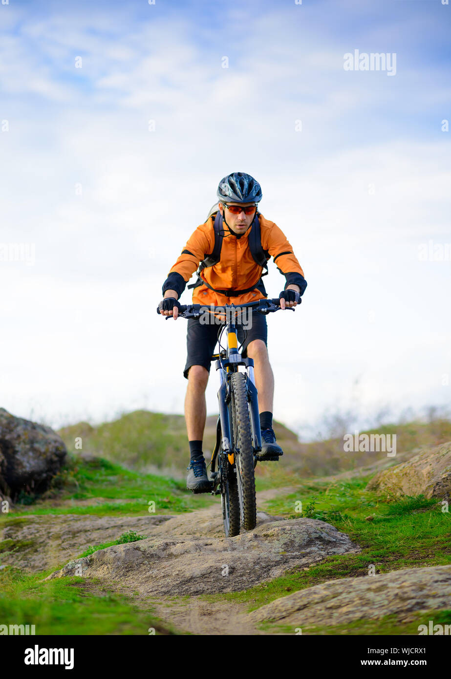 Cyclist Riding the Bike on the Beautiful Spring Mountain Trail Stock ...