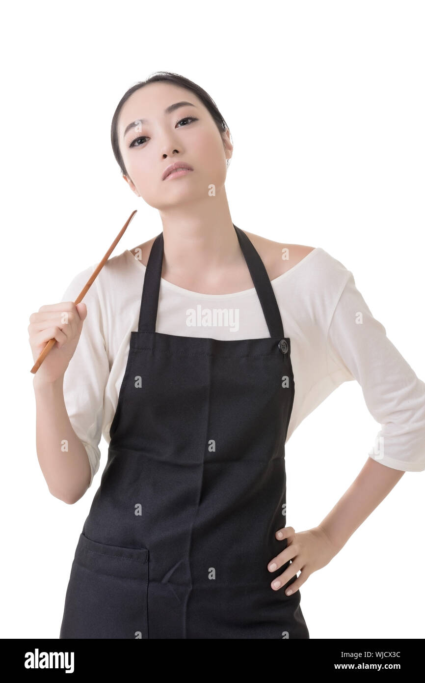 Young Asian Housewife Hold A Spatula In Apron Closeup Portrait