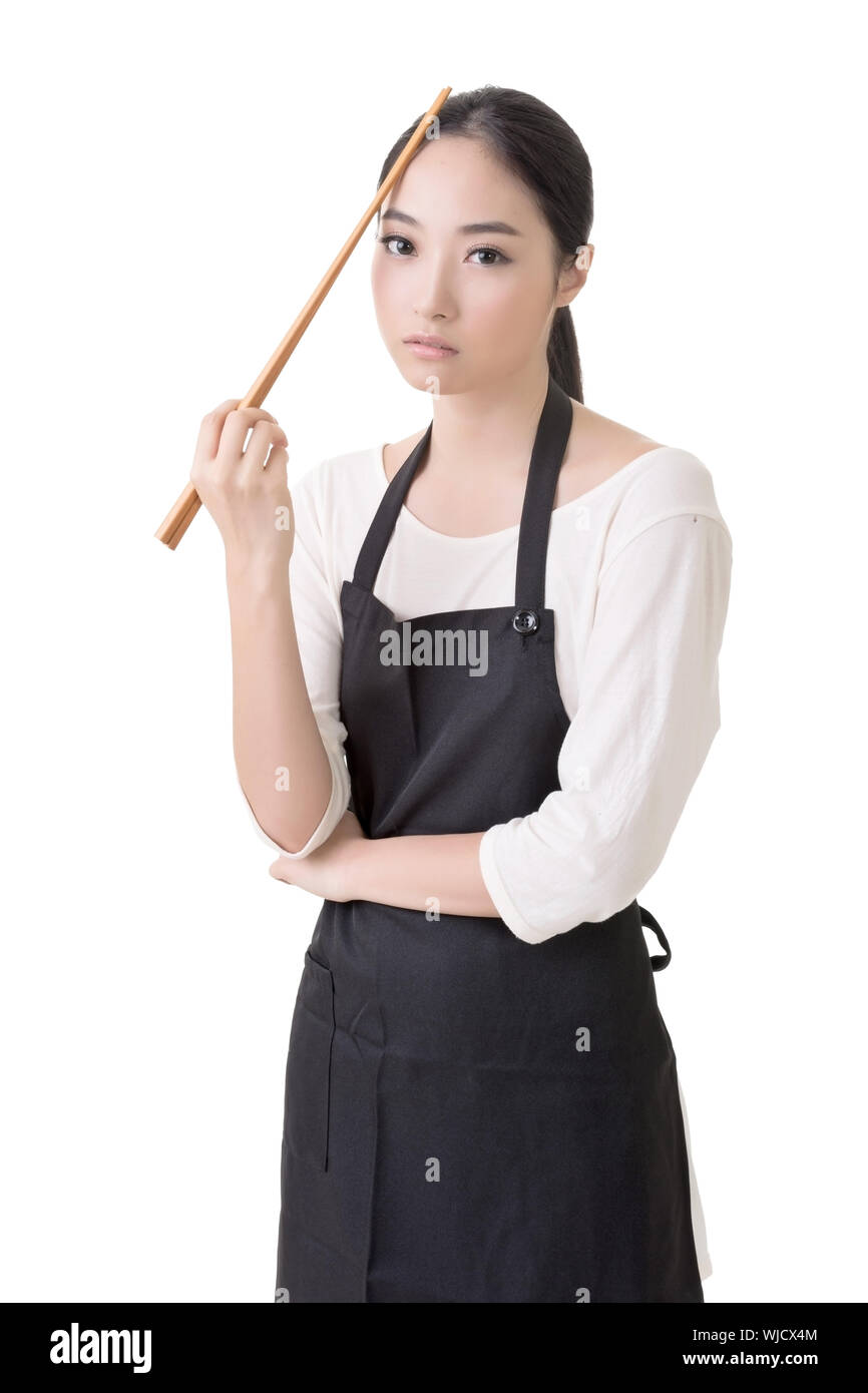 Young Asian Housewife Hold A Chopsticks In Apron Closeup Portrait On