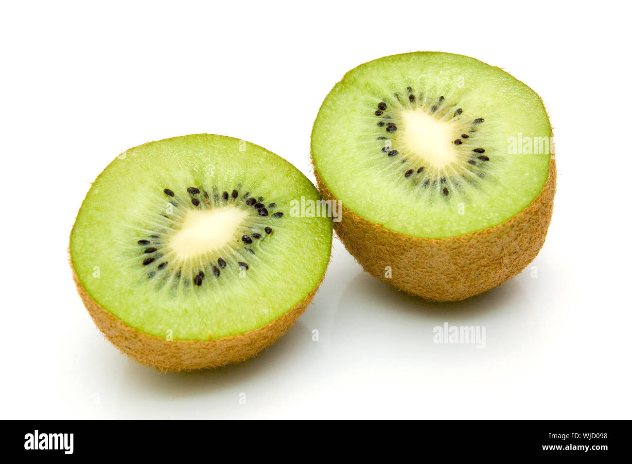 Parts of a kiwi on a white background Stock Photo - Alamy