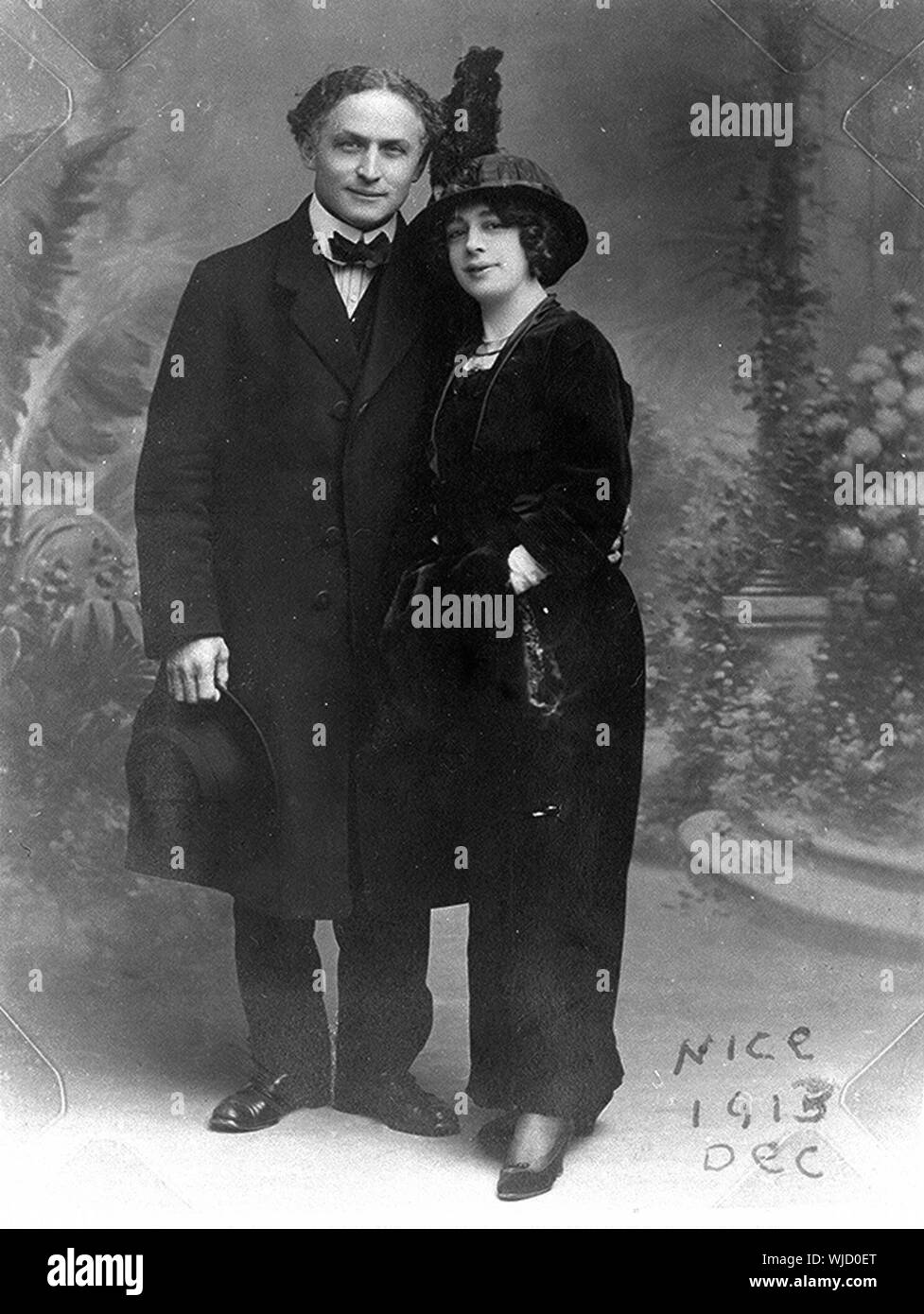 Harry Houdini, full-length portrait, standing, facing front, in chains ...