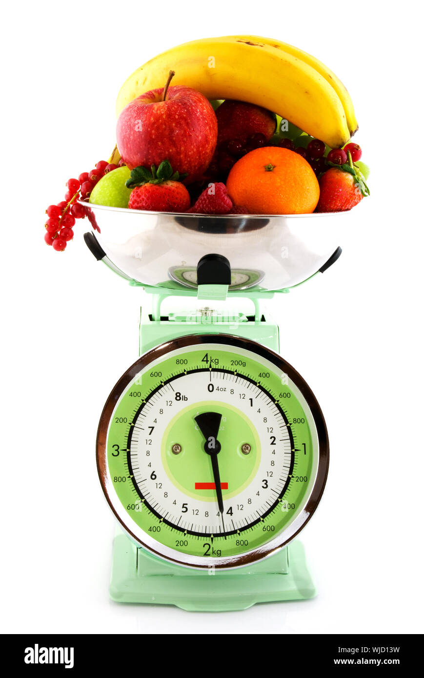 Retro kitchen scale with a diversity of fruit Stock Photo - Alamy