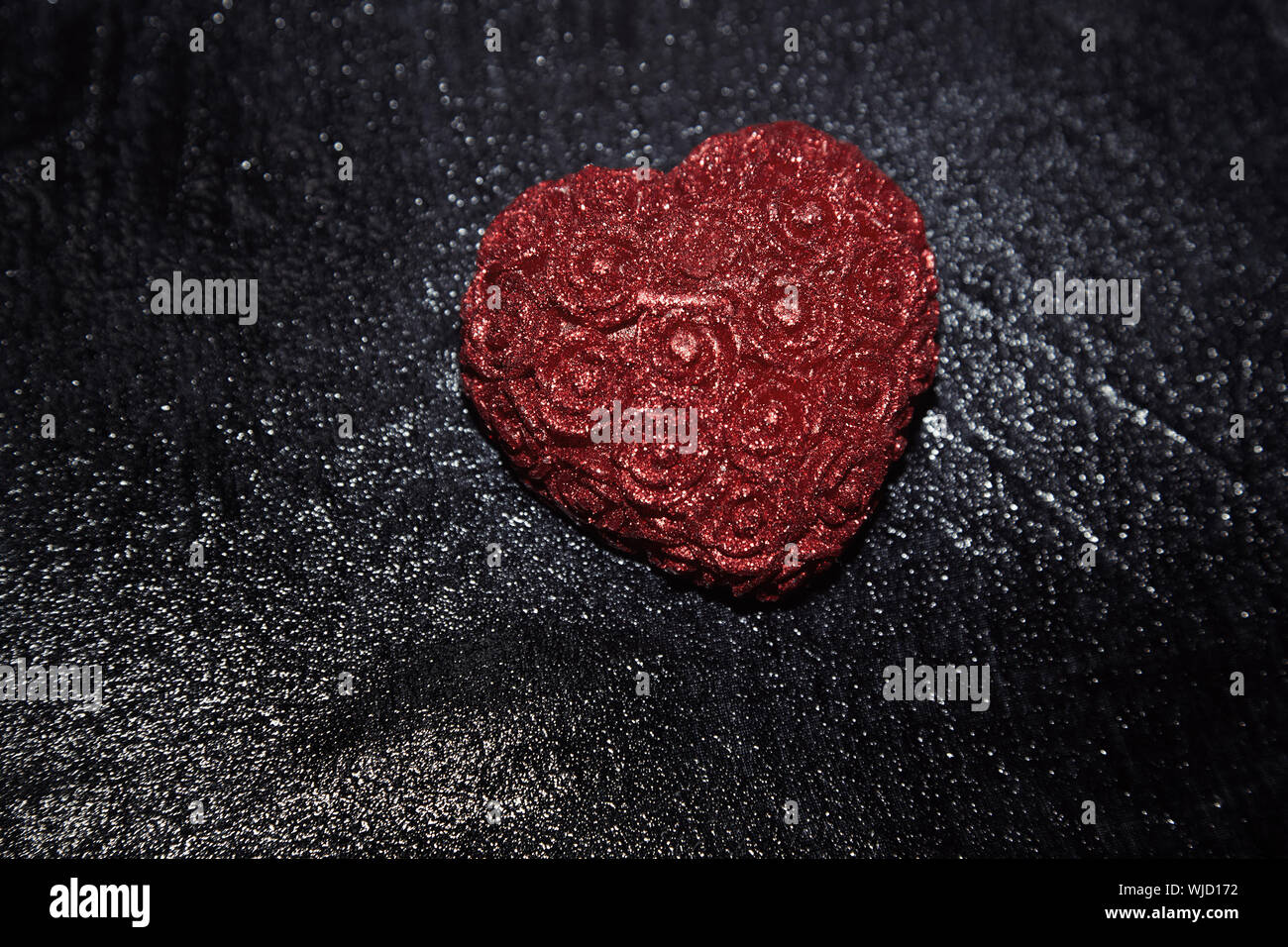 Heart shape in heavy rain. Close-up view Stock Photo - Alamy