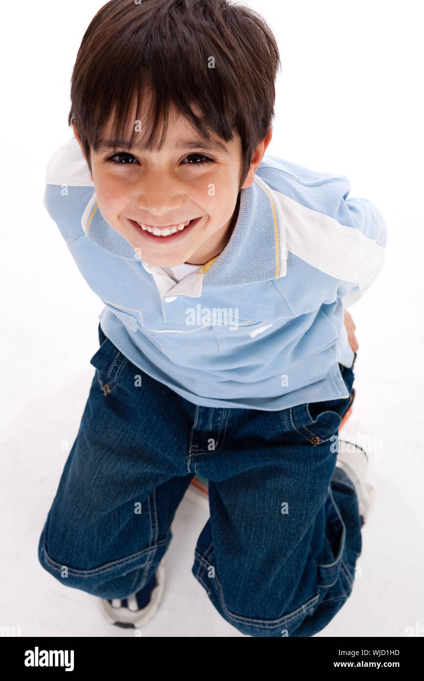 Top view of cute kid sitting over isolated on white background,ariel ...