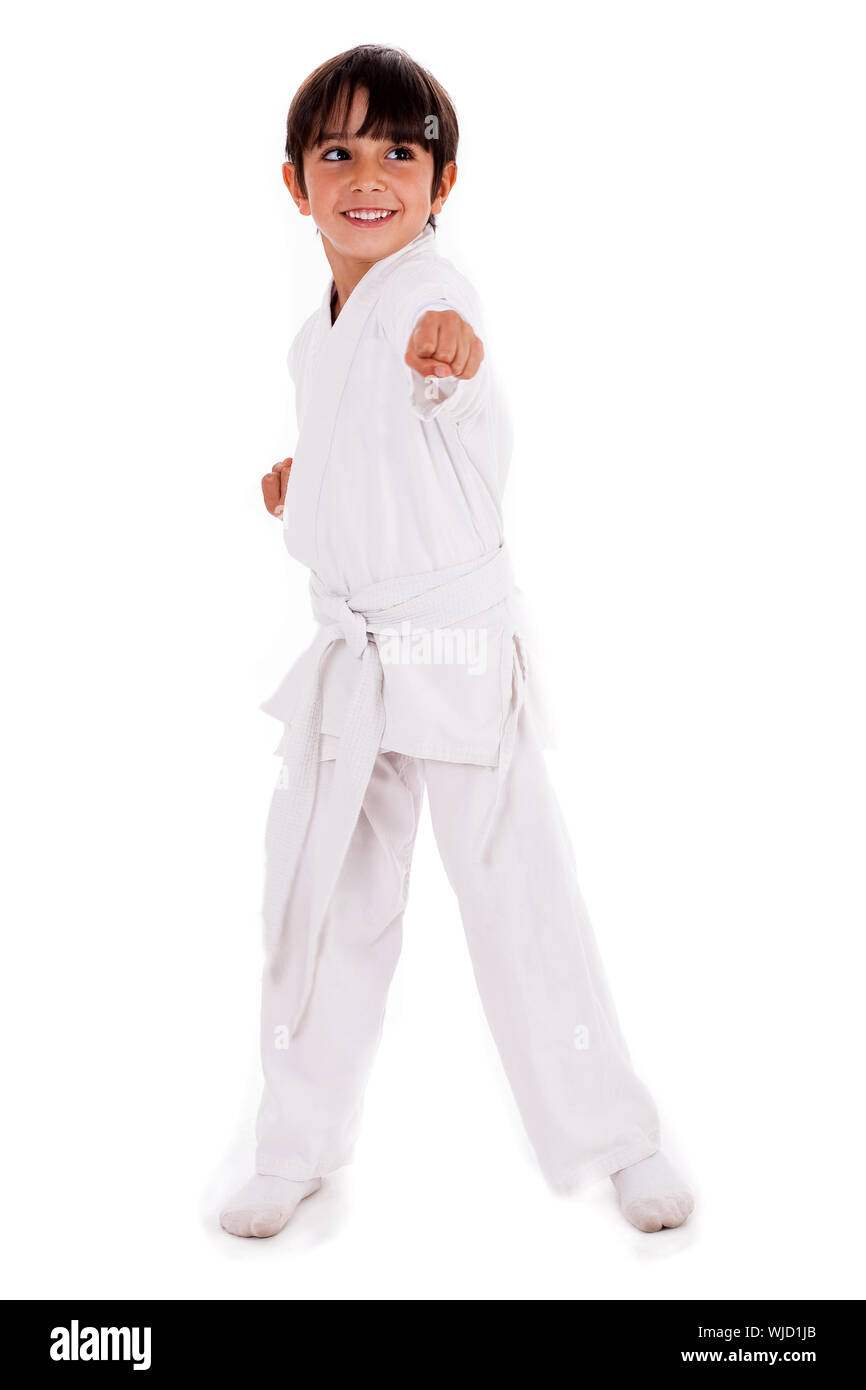 Small karate boy in training isolated white background Stock Photo - Alamy