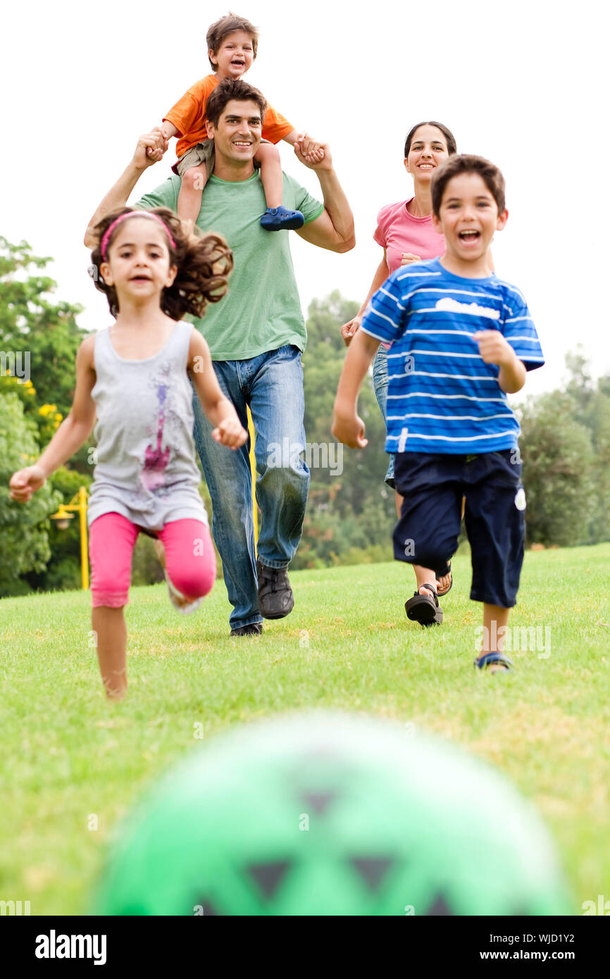 Family having fun outdoors Stock Photo - Alamy