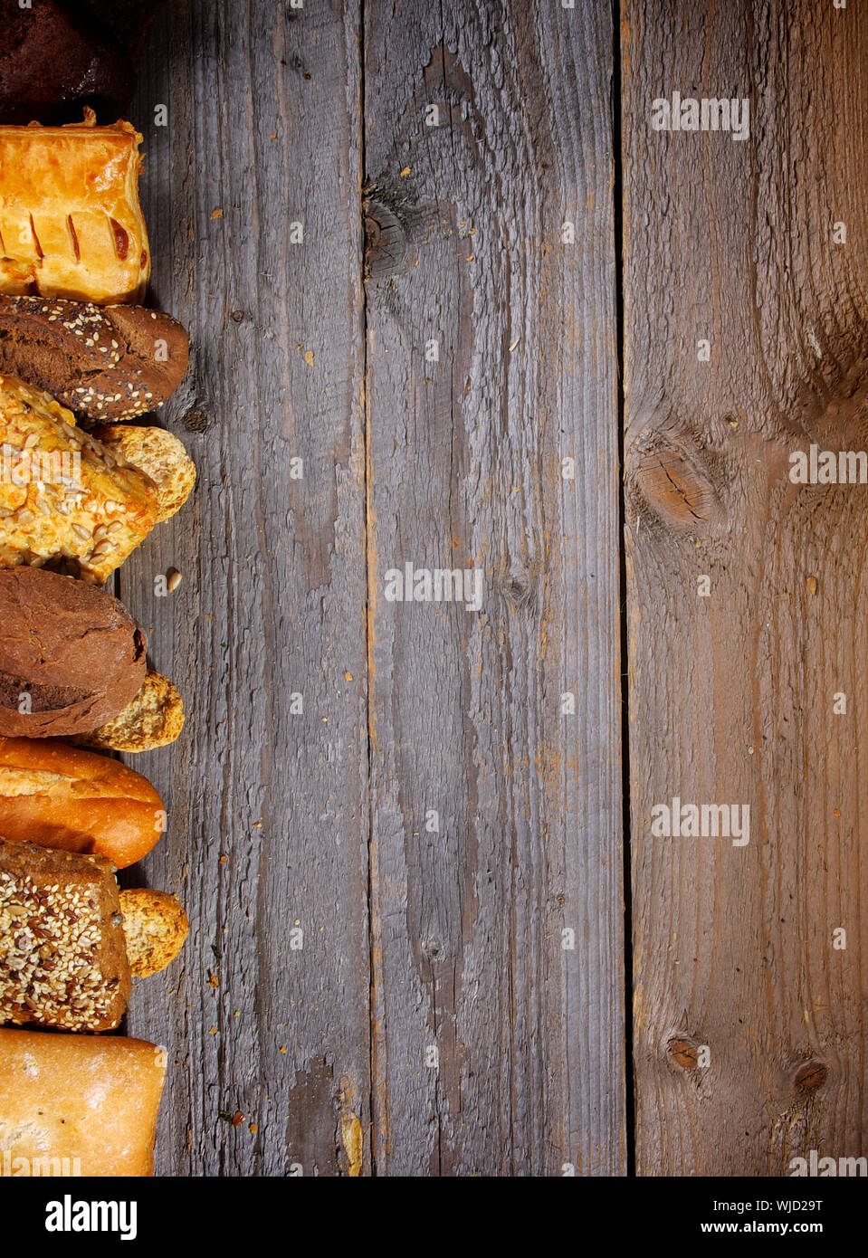 Border of Various Buns, Baguette, Poppy Seed and Sesame Buns, Rye and ...