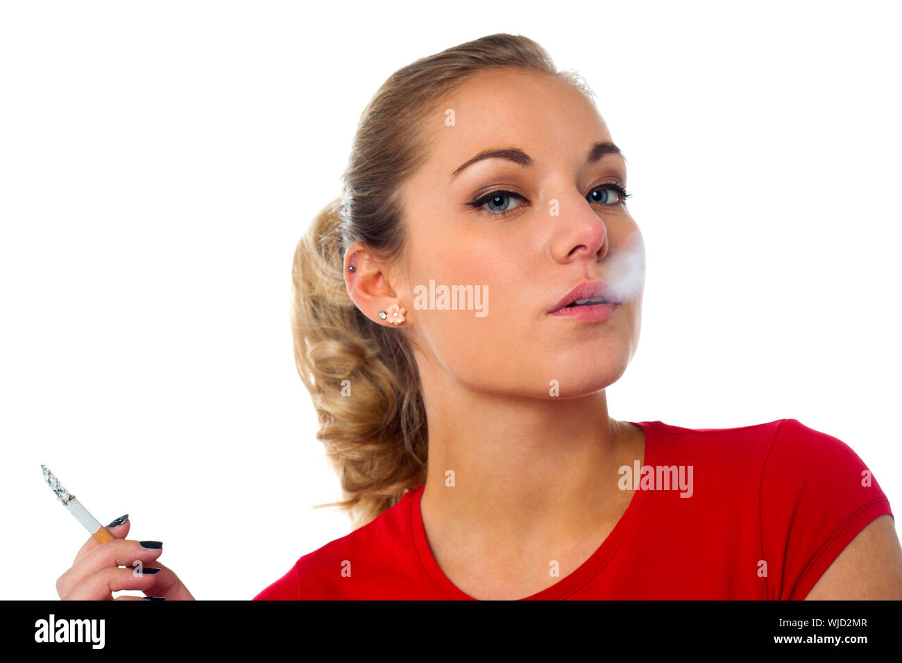 Female model smoking a cigarette Stock Photo - Alamy