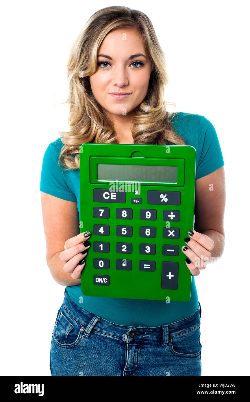 Teen girl posing with calculator Stock Photo - Alamy