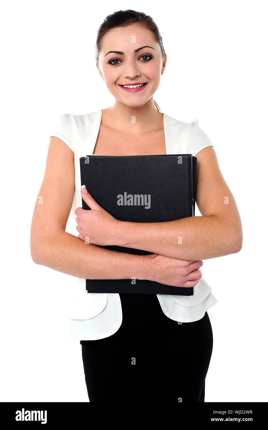 Female executive posing with company records Stock Photo - Alamy