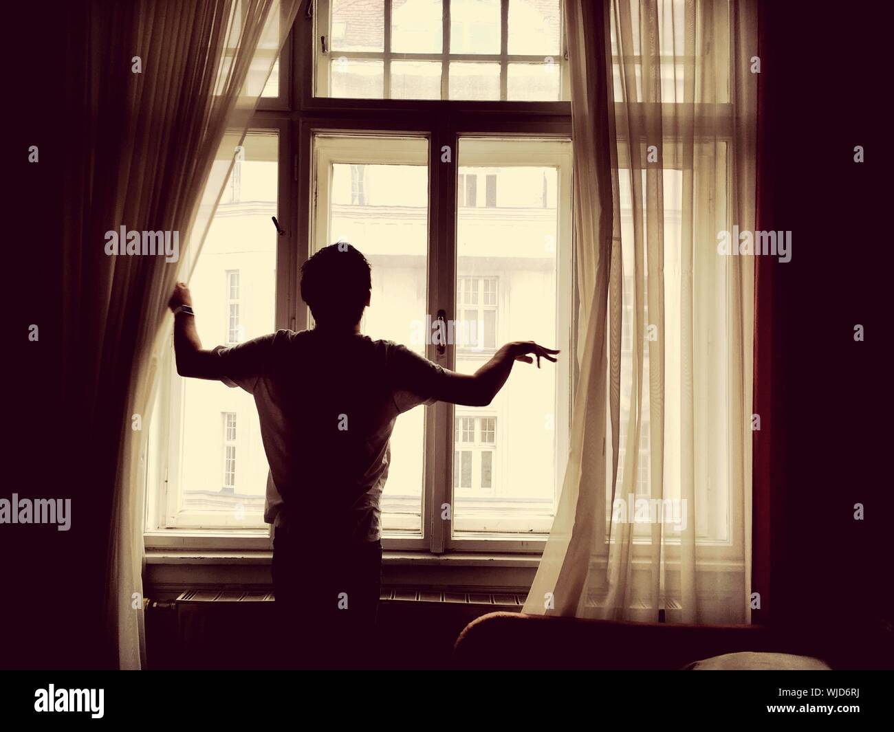 Man window silhouette domestic hi-res stock photography and images - Alamy