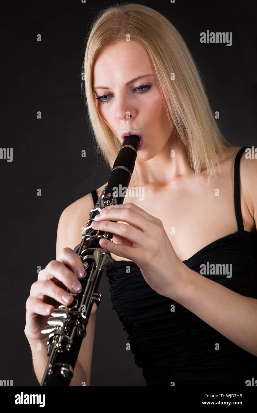 Teen playing clarinet hi-res stock photography and images - Alamy