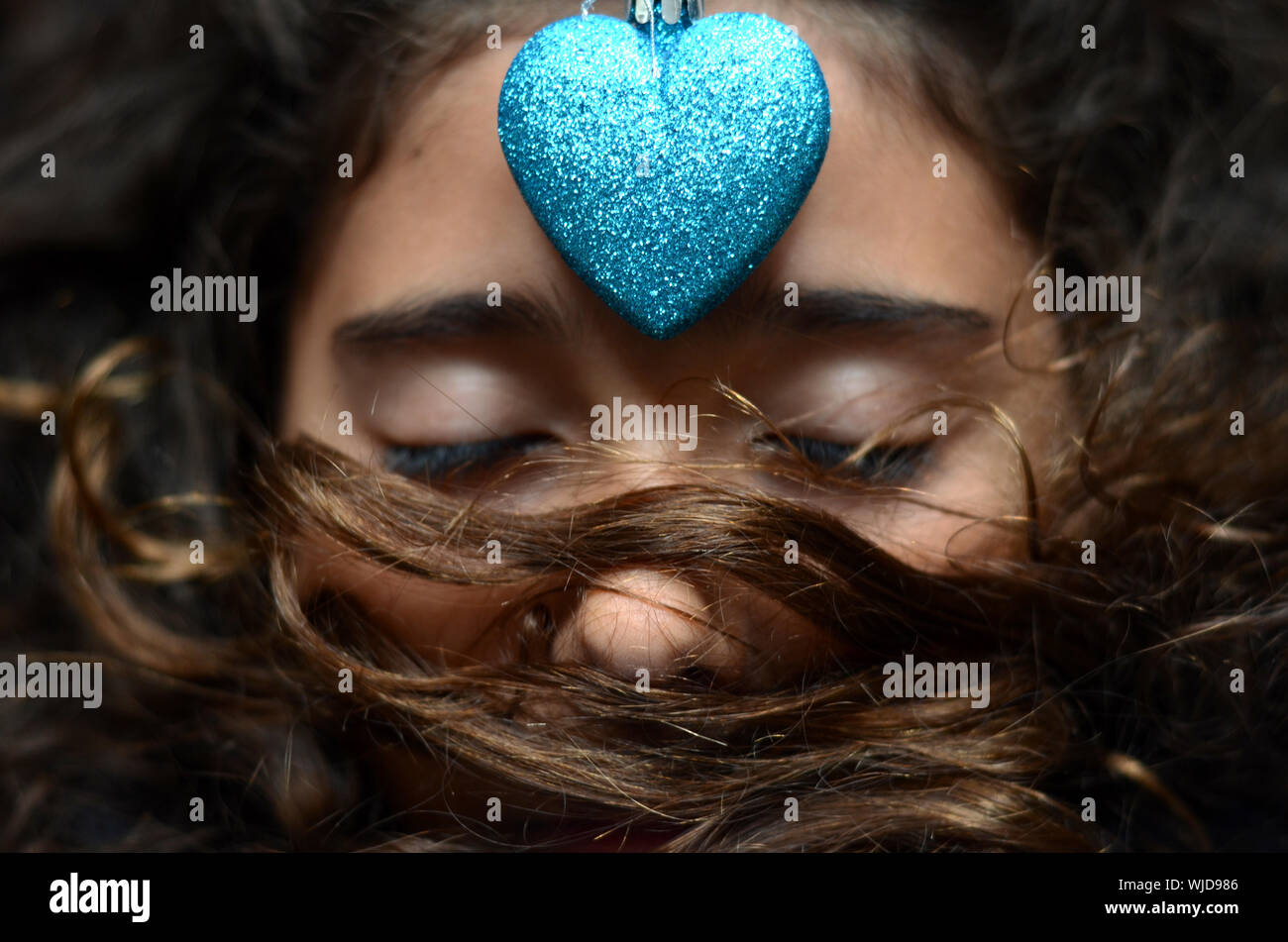 Glitter on forehead hi-res stock photography and images - Alamy