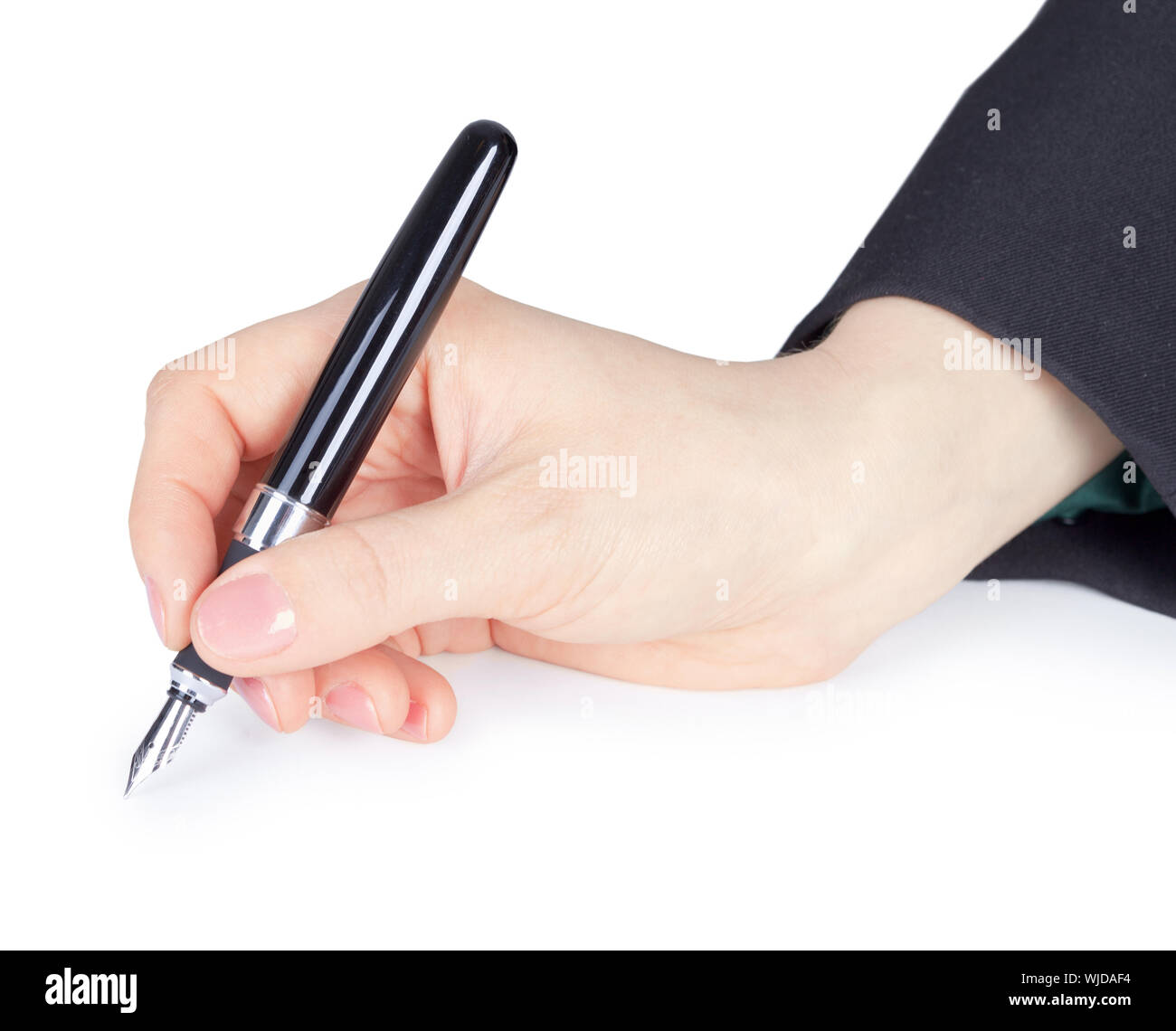 The female hand holds a pen, is isolated on a white background Stock ...