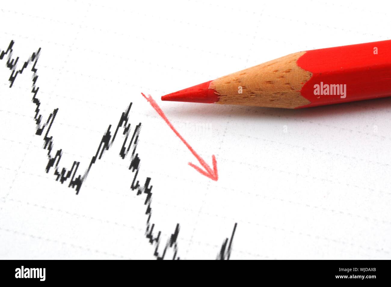 free fall of the stock market concept with red pen and business chart ...