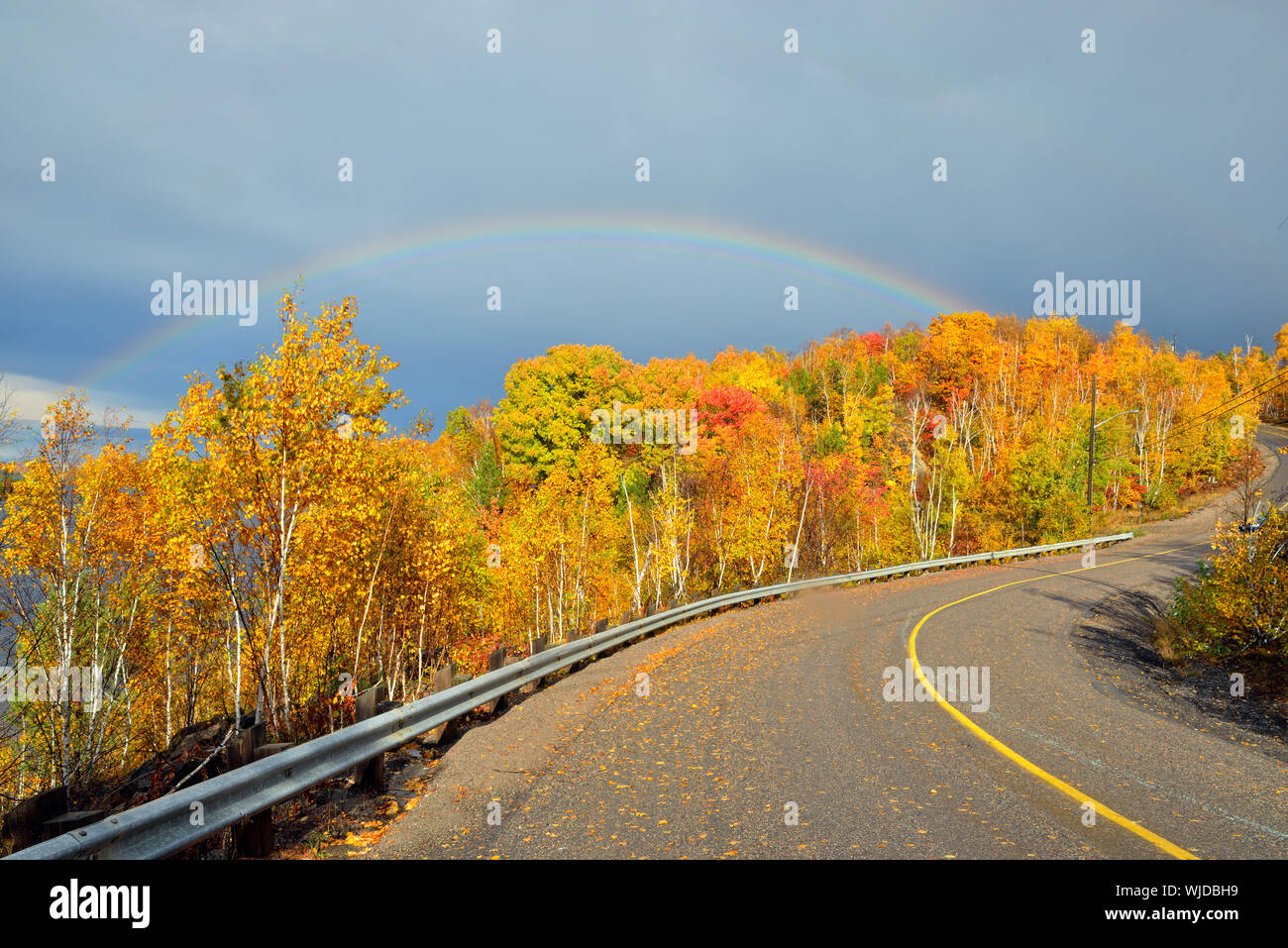 Rainbow over Ramsey Lake in autumn, Greater Sudbury, Ontario, Canada ...