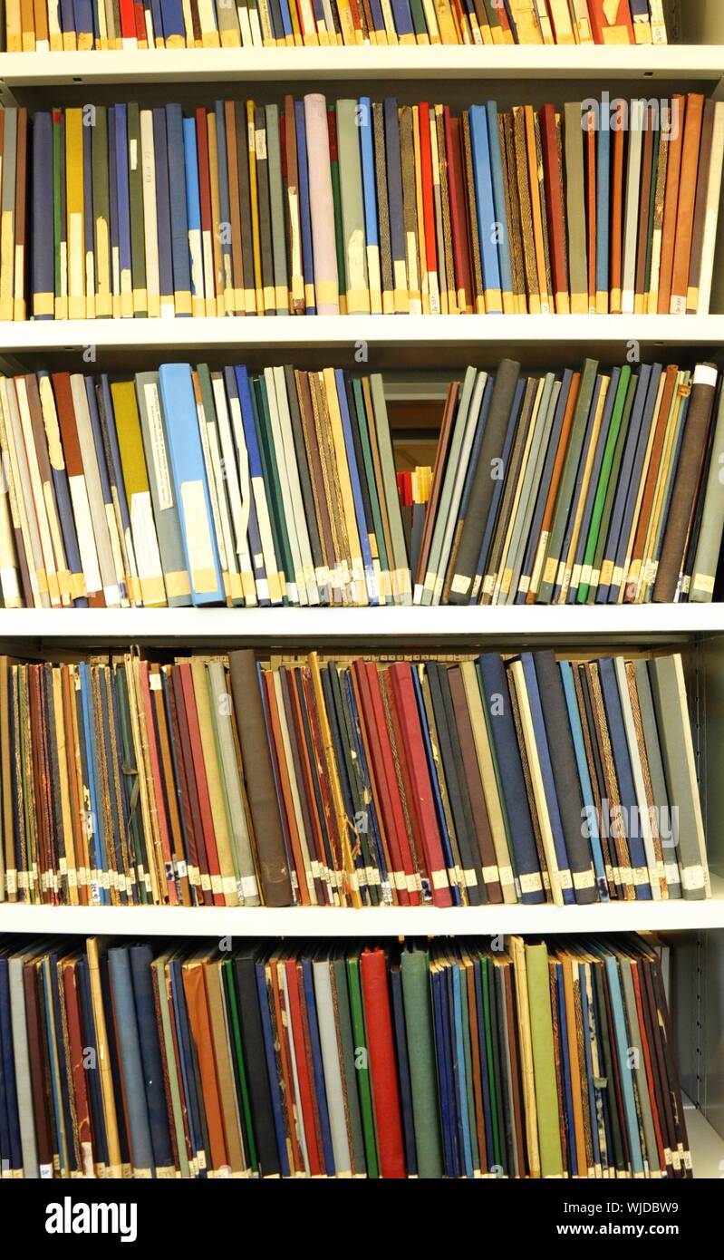 education books in a library showing school or university concept Stock ...
