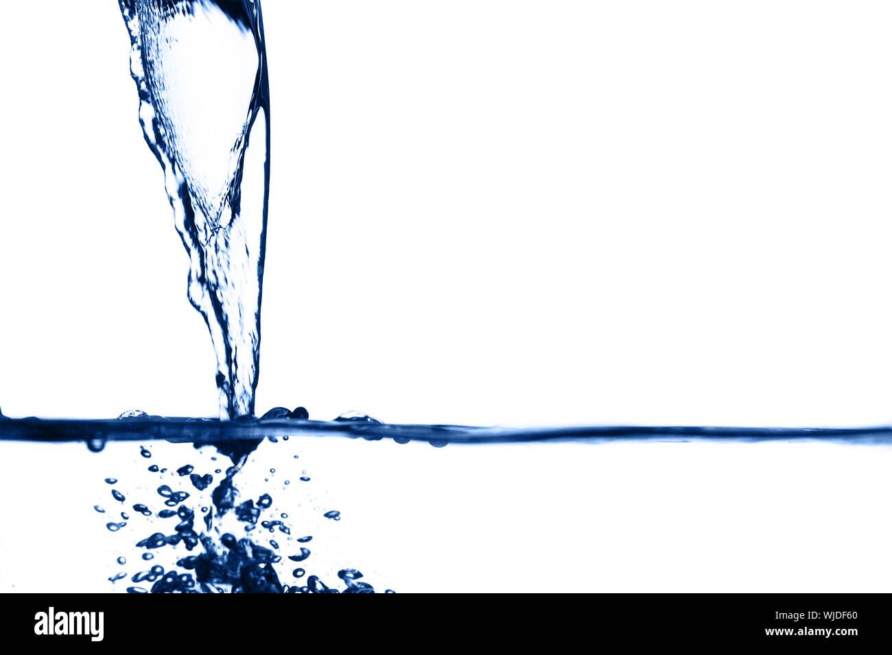 Crisp, clear, blue water falling into a puddle Stock Photo - Alamy